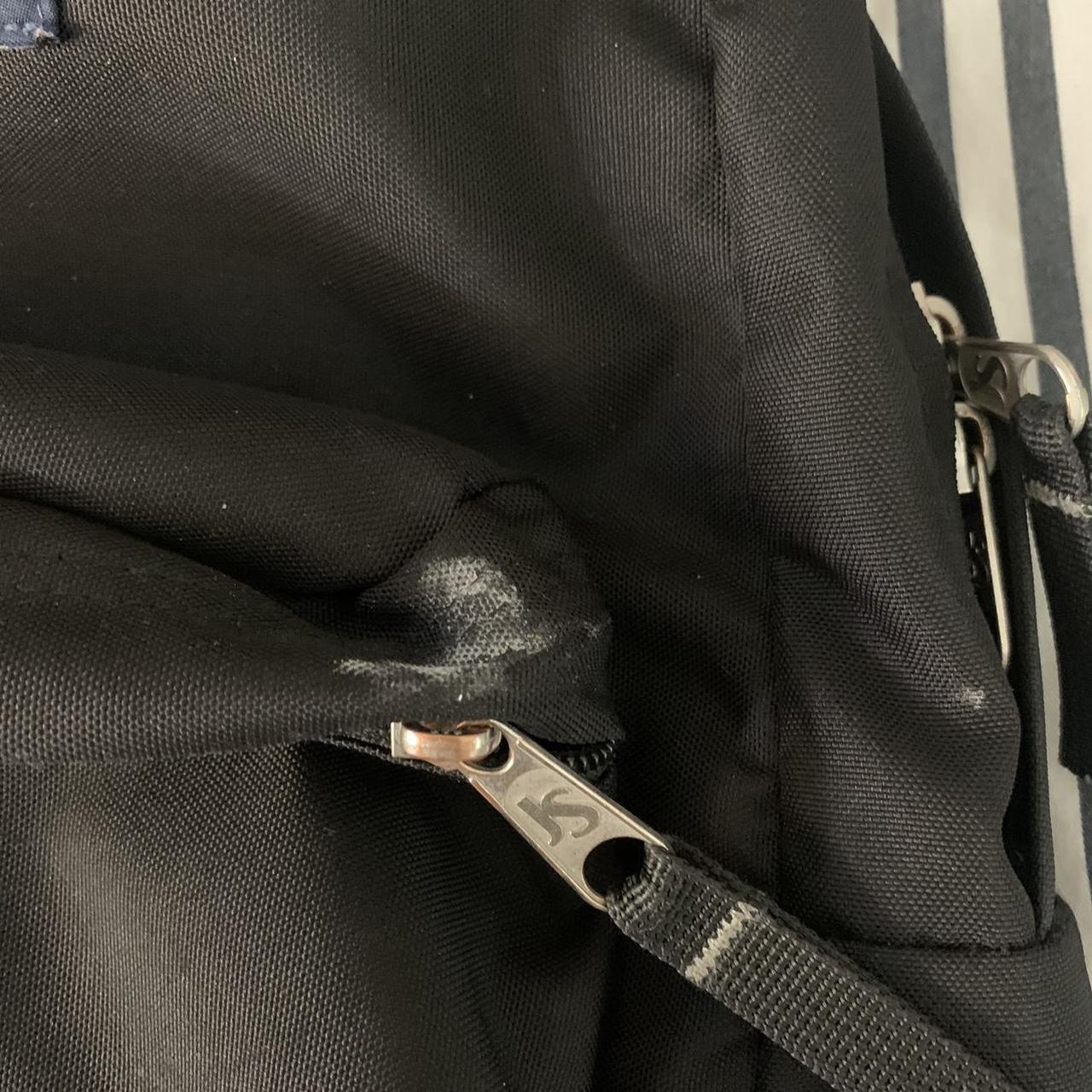 Jansport black backpack Small soap stain on front... - Depop