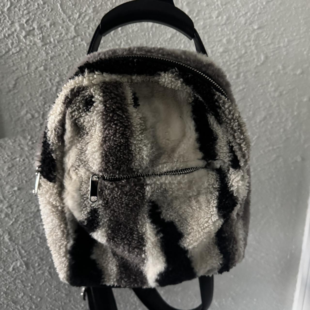 Black and white fur backpack #fauxfur #wildfable... - Depop