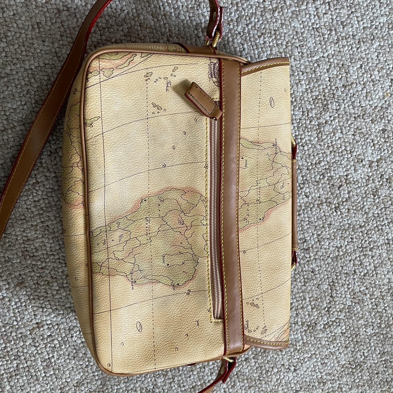 Vintage world map travel bag! The bag has a strap on... - Depop