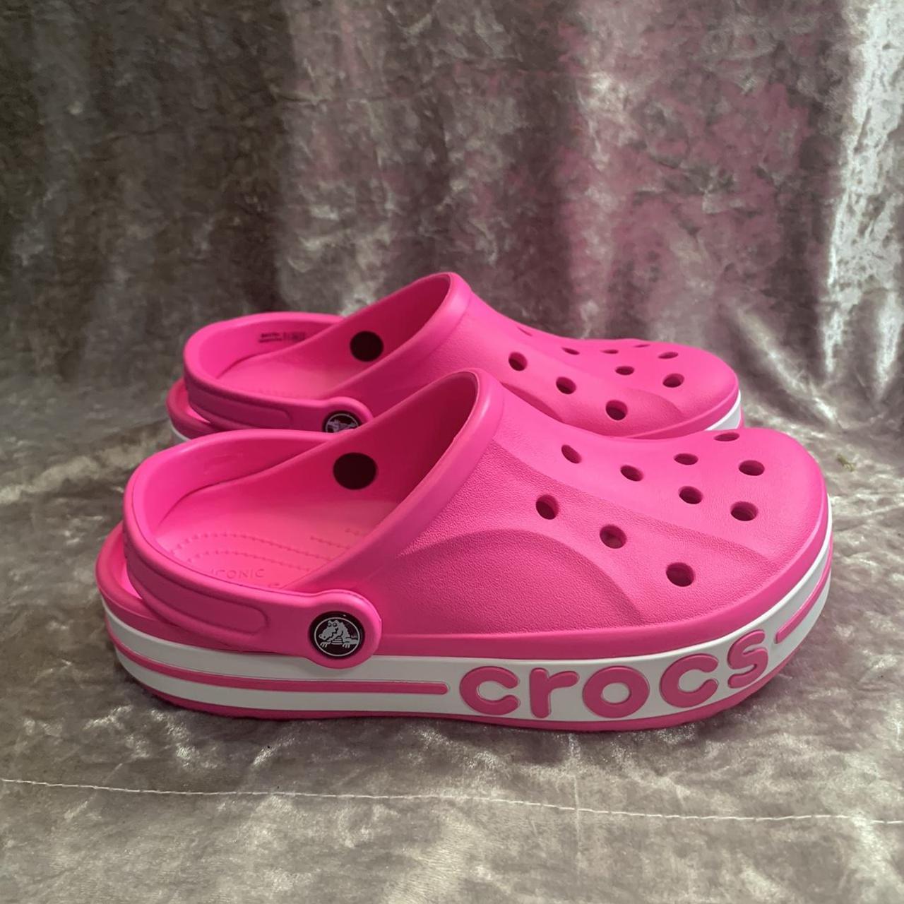 Brand new hot pink crocs with white trim! Size: men... - Depop