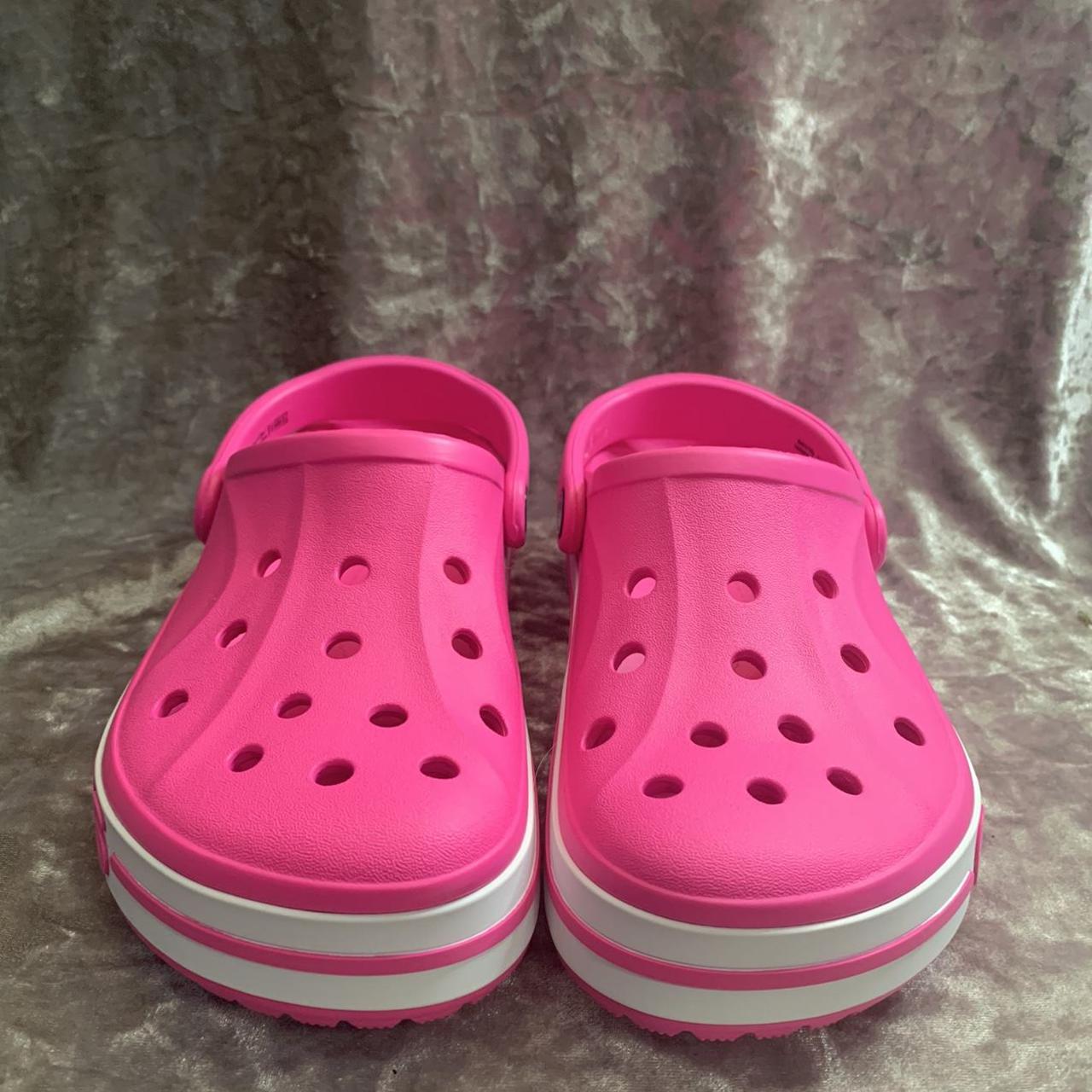 Brand new hot pink crocs with white trim! Size: men... - Depop