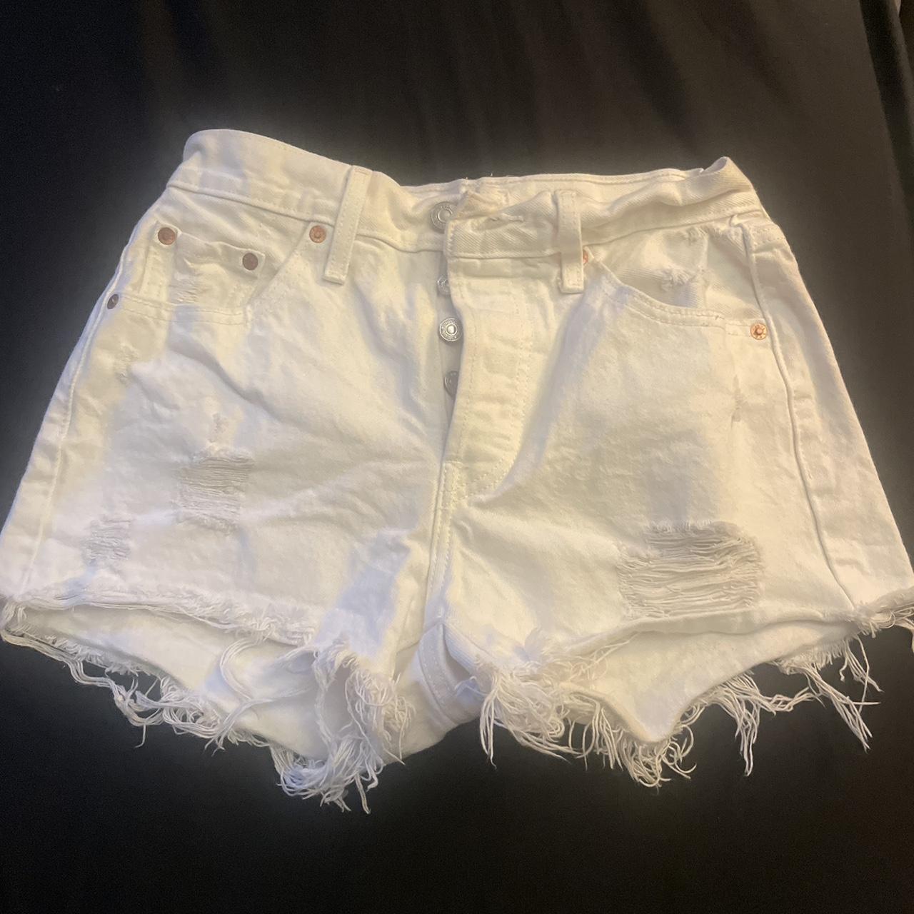White ripped Levi’s jean shorts size 25 - Depop