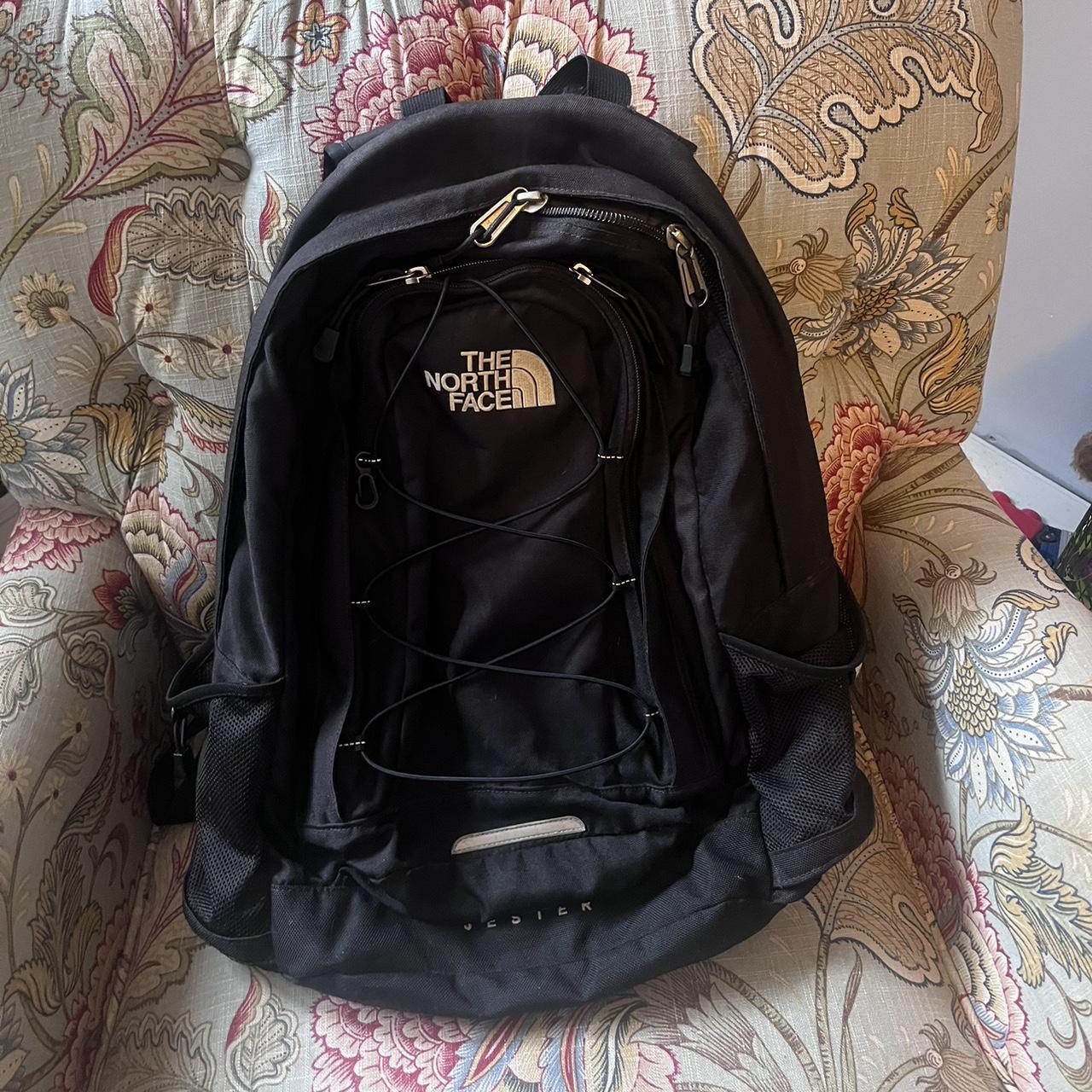 The North Face black Jester backpack. Two larger... - Depop