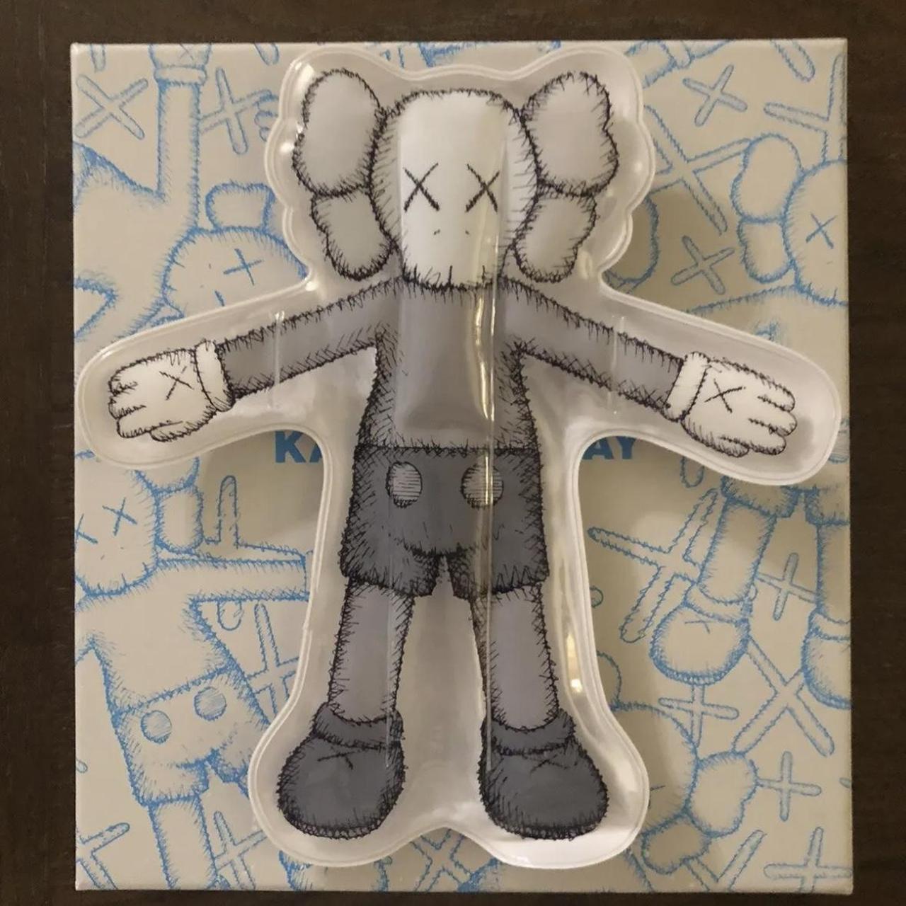 KAWS. (American. b. 1974). Rare. 'Holiday: Hong... - Depop