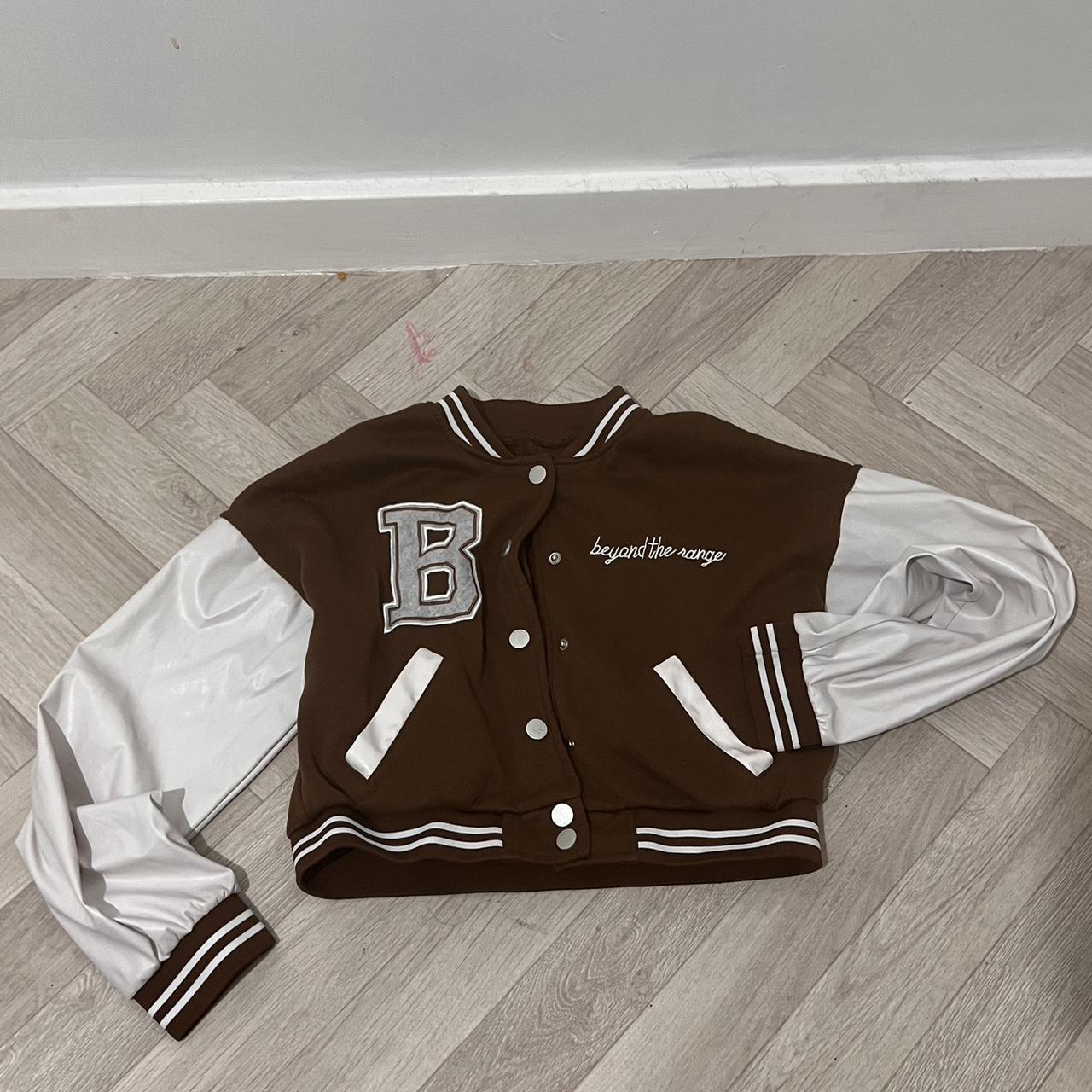 Brown and white varsity jacket - Depop