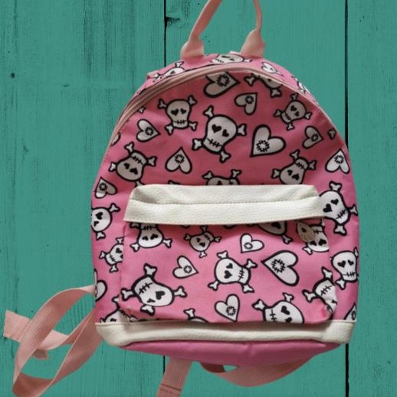 New medium skulls backpack, pink, rare, punk, emo,... - Depop