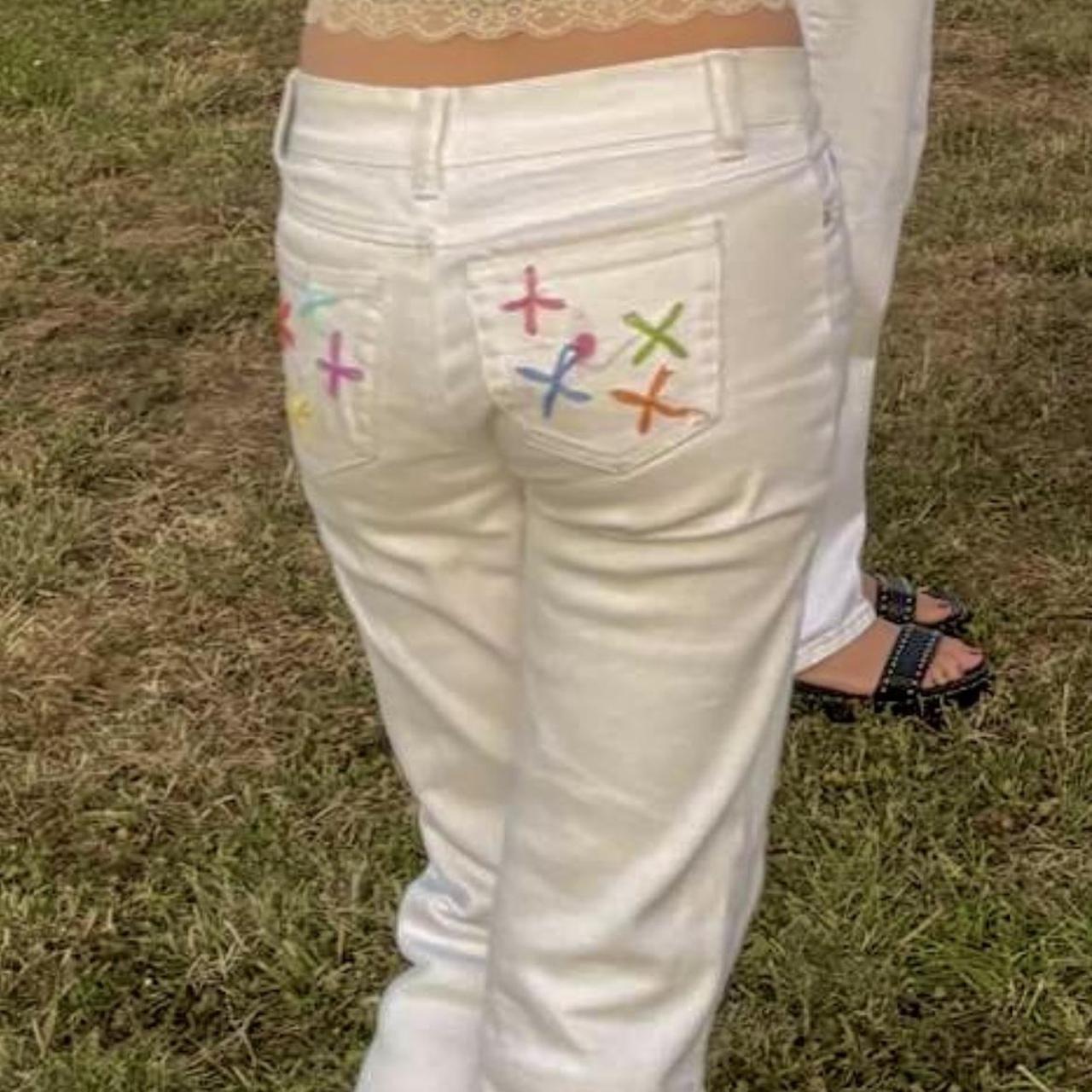white low rise jeans with stitching on pockets will... - Depop