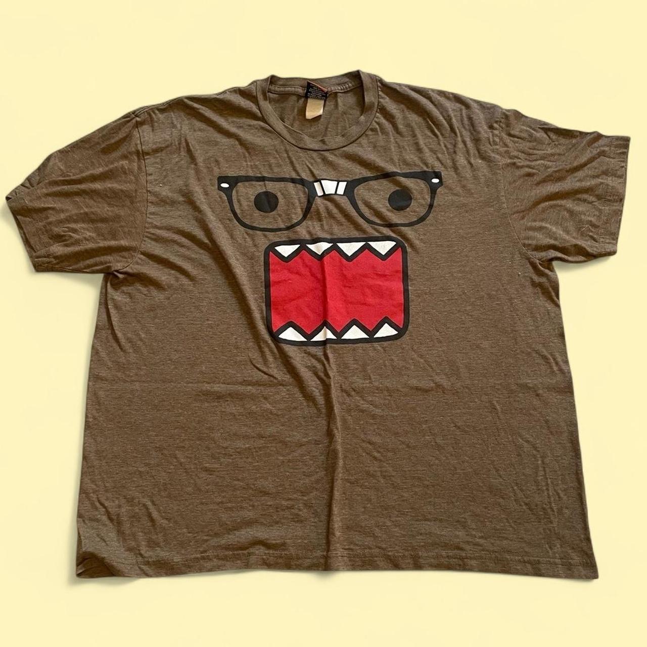brown nerdy domo graphic t-shirt. size tag washed... | Depop