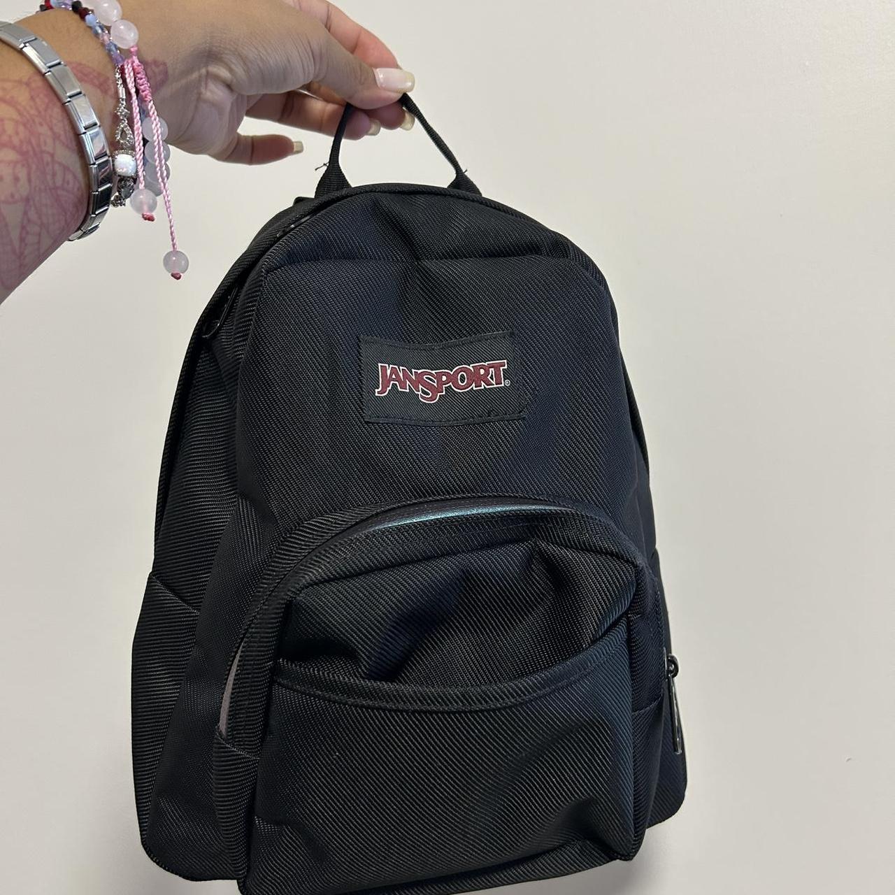 Black Jansport mini backpack with adjustable... - Depop