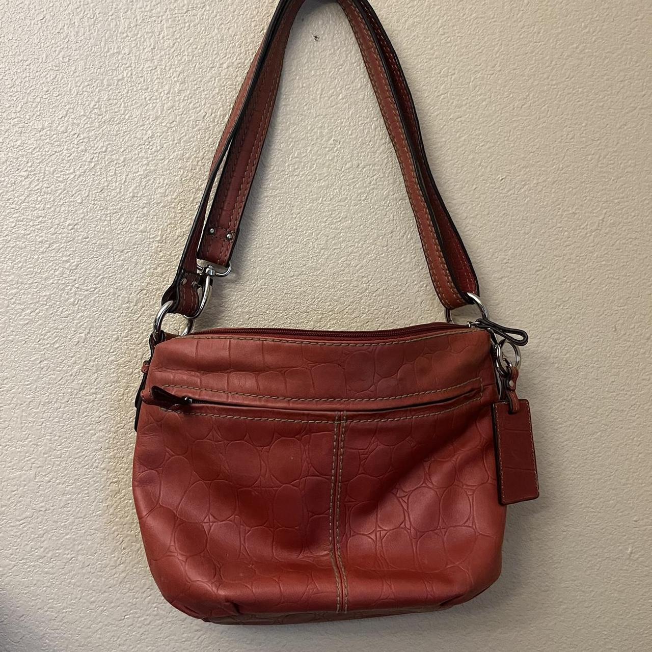 Red tingnanello purse with tan stitching. It has the... - Depop