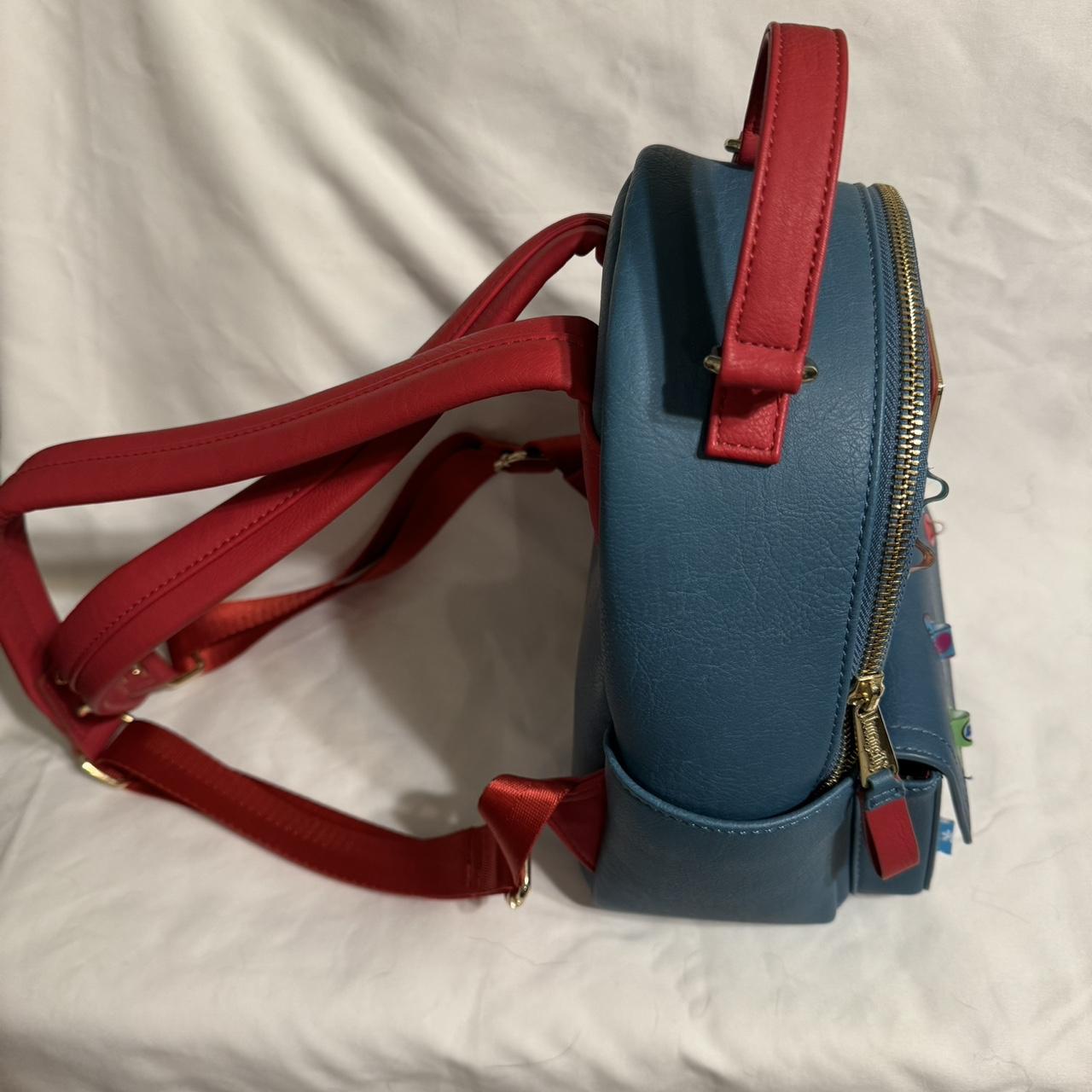 Blue and red Pixar loungefly backpack... - Depop