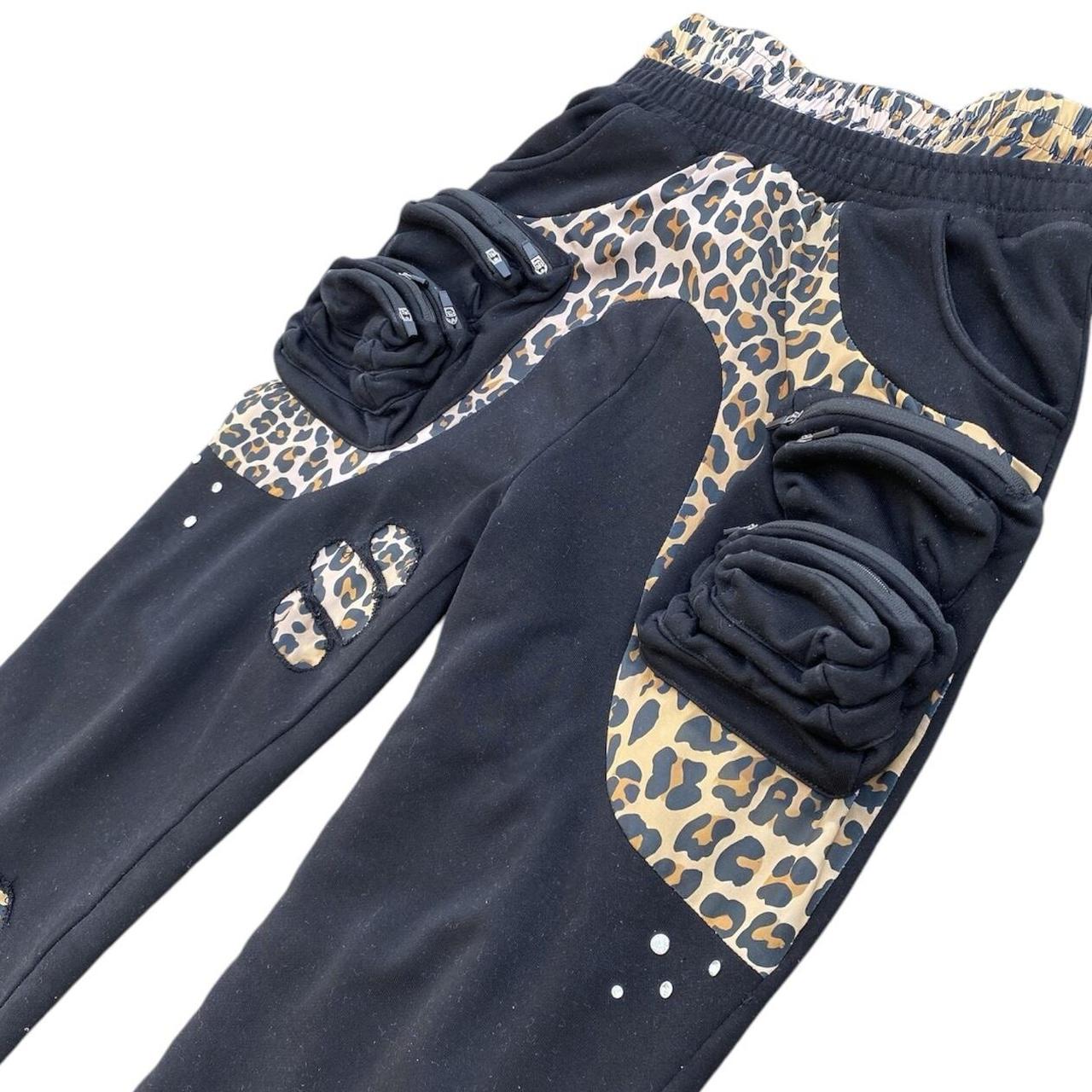 Leopard print flared sweats, 10 zipper pockets 2... - Depop