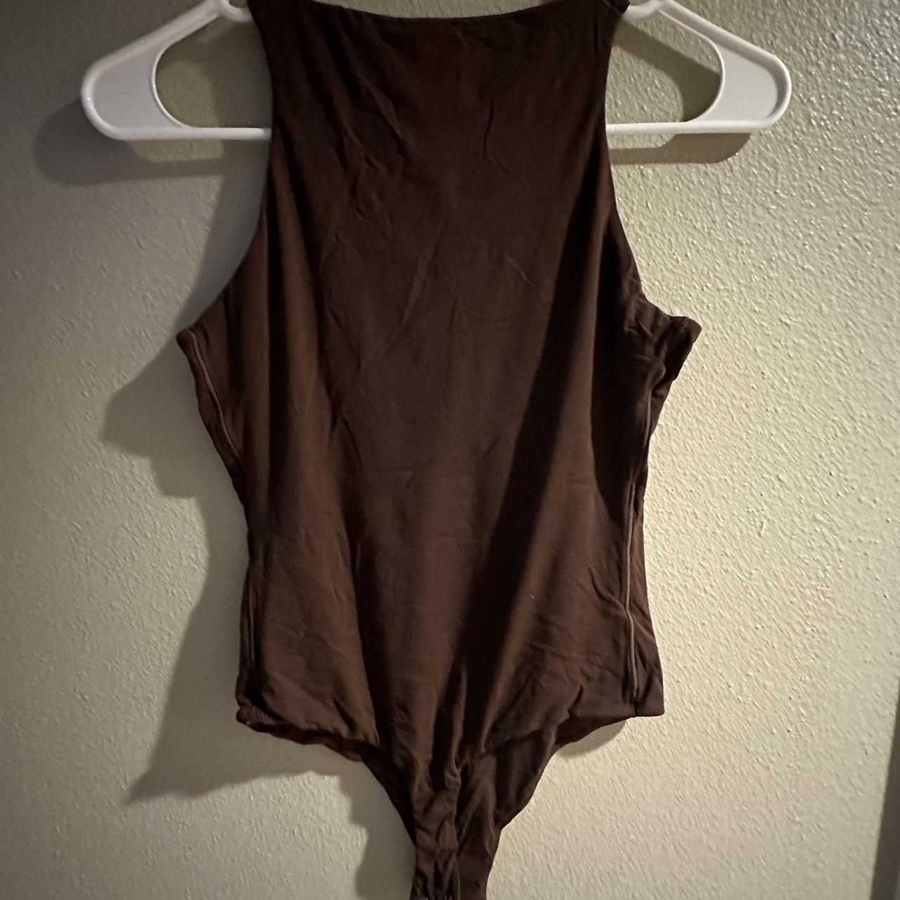 Skims brown body suit -wore once ( too big on me)... - Depop