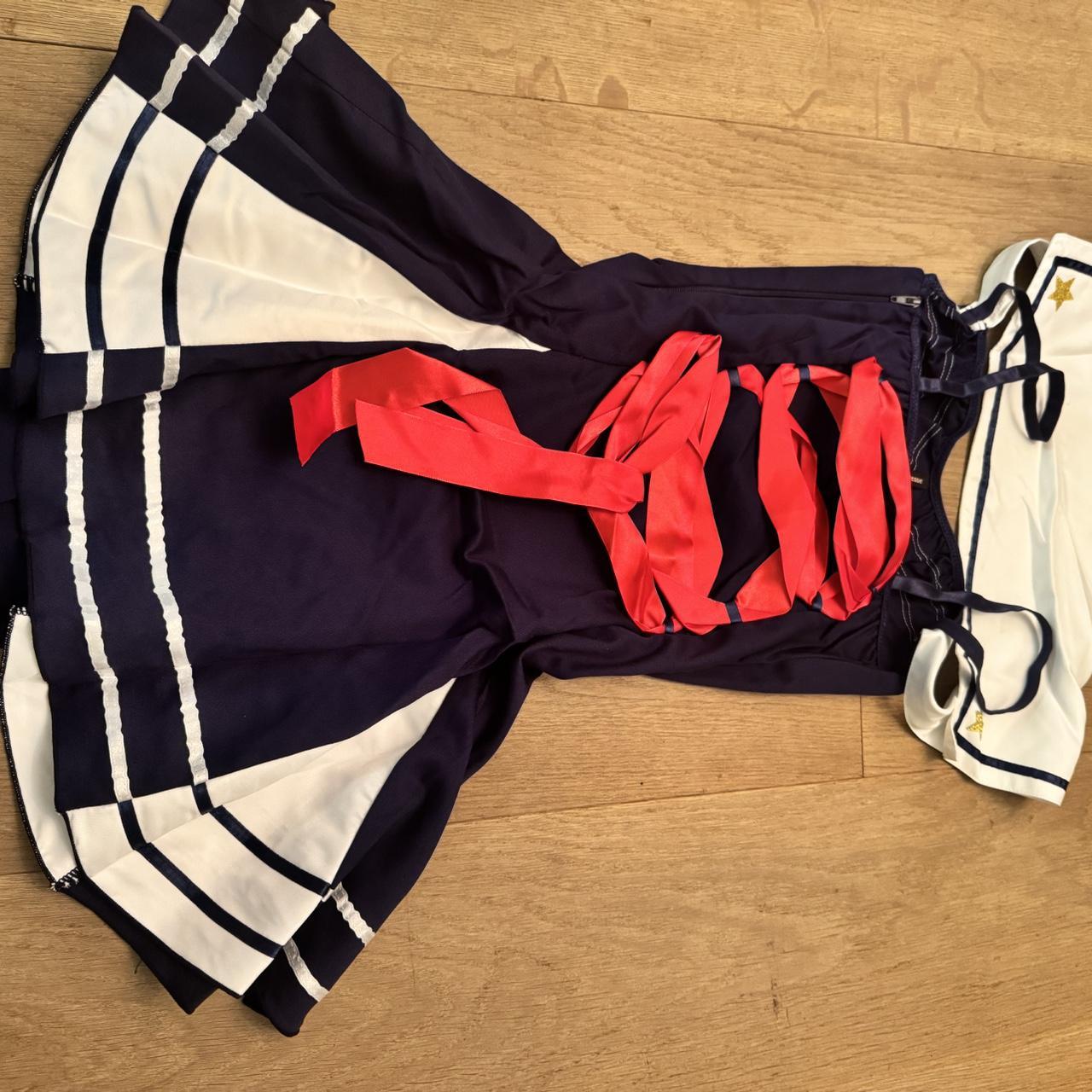 Cute sailor mini dress with red ribbons and gold... - Depop