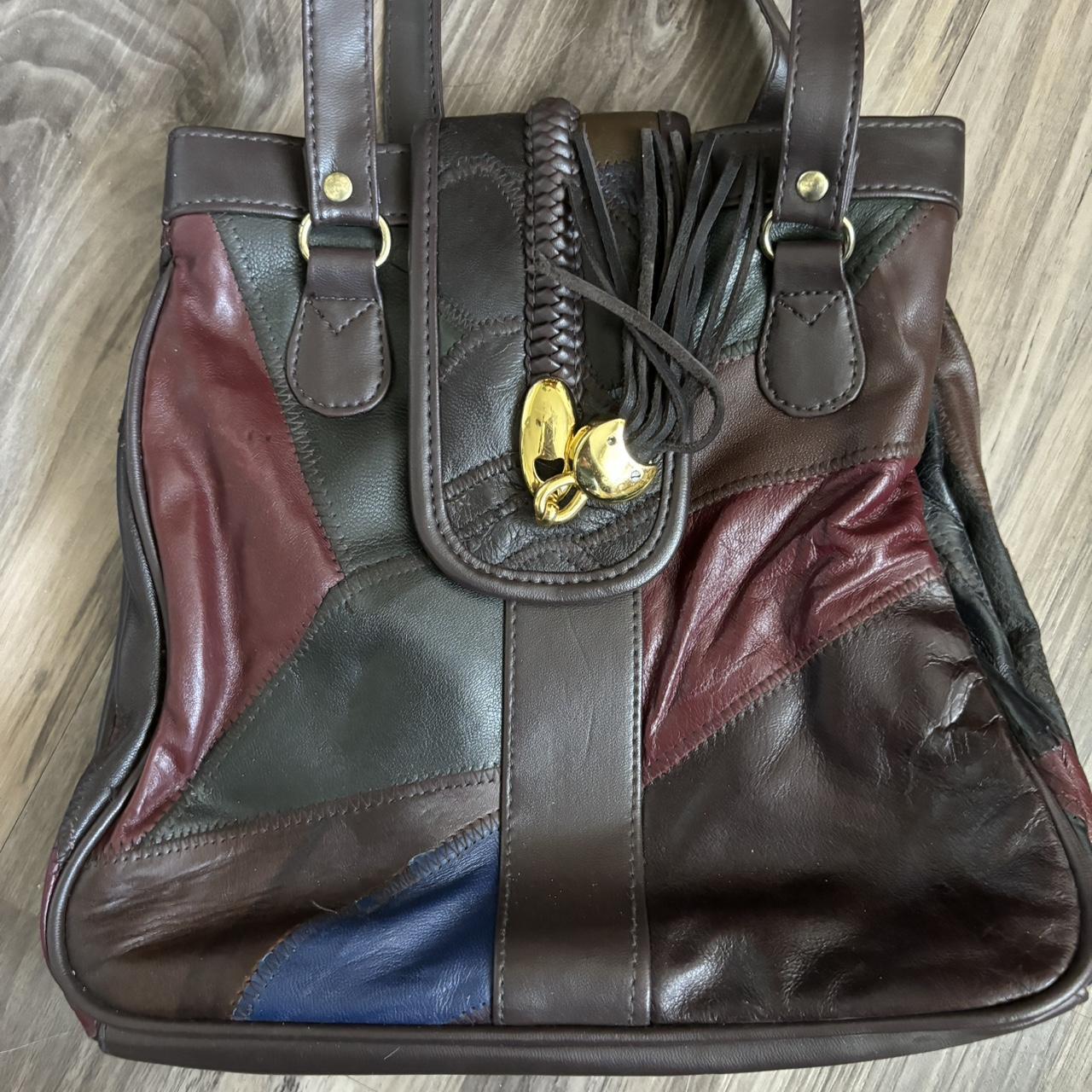 Brown and multi-coloured leather purse with a zipper... - Depop