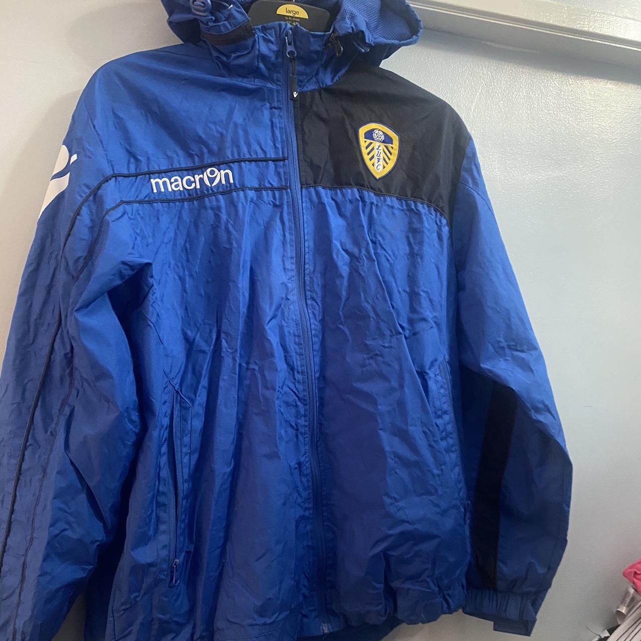 Macron Men's Blue and Black Jacket | Depop