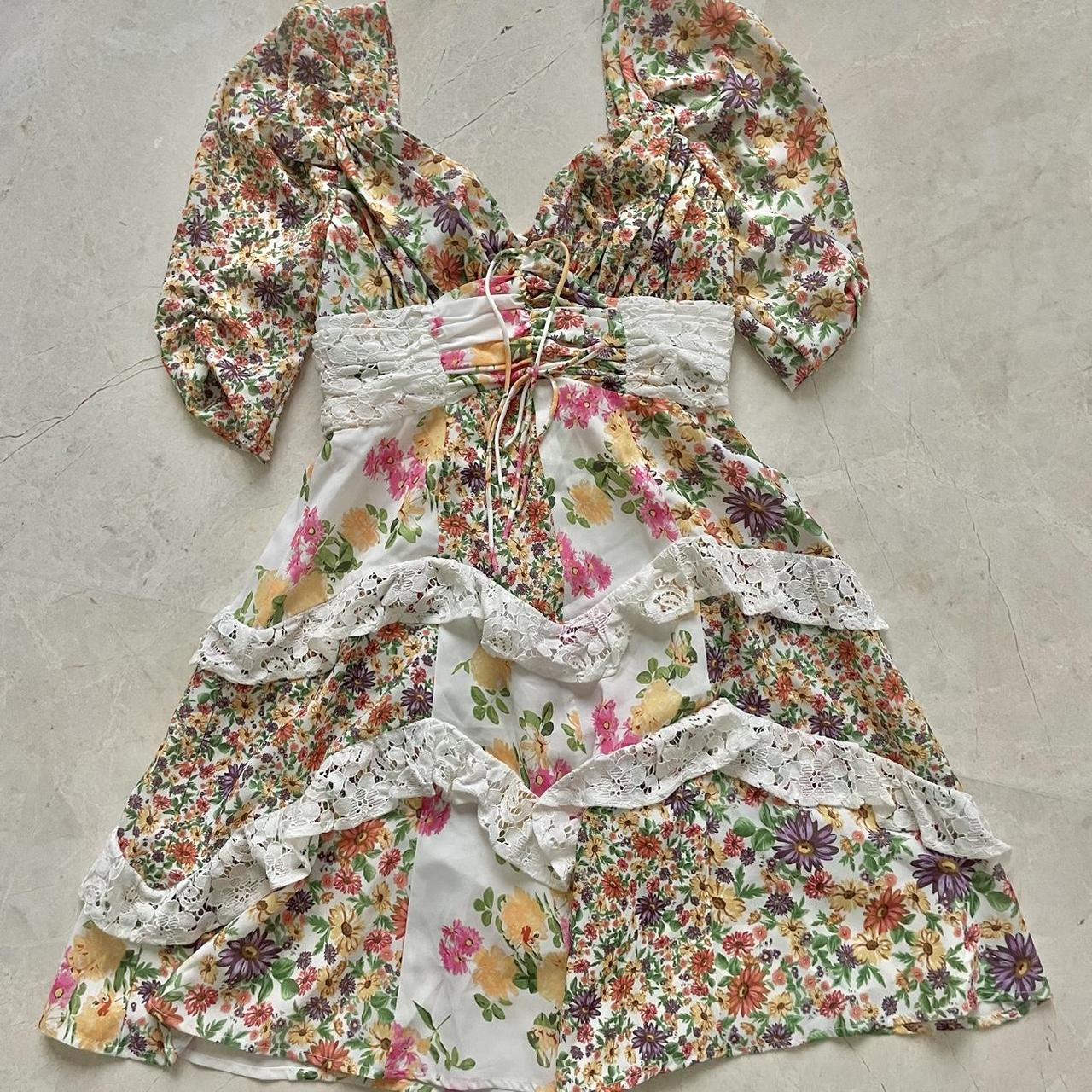 Floral mini dress For love and lemons doop! never... - Depop