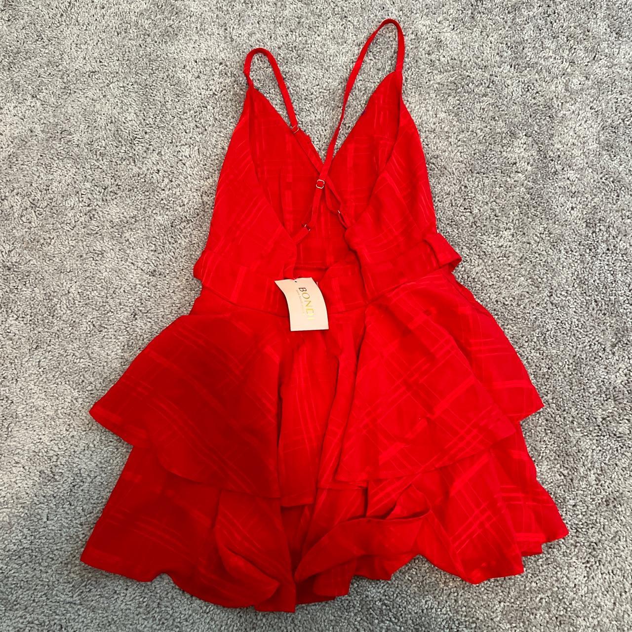 red jumpsuit with tags attached. has adjustable... - Depop