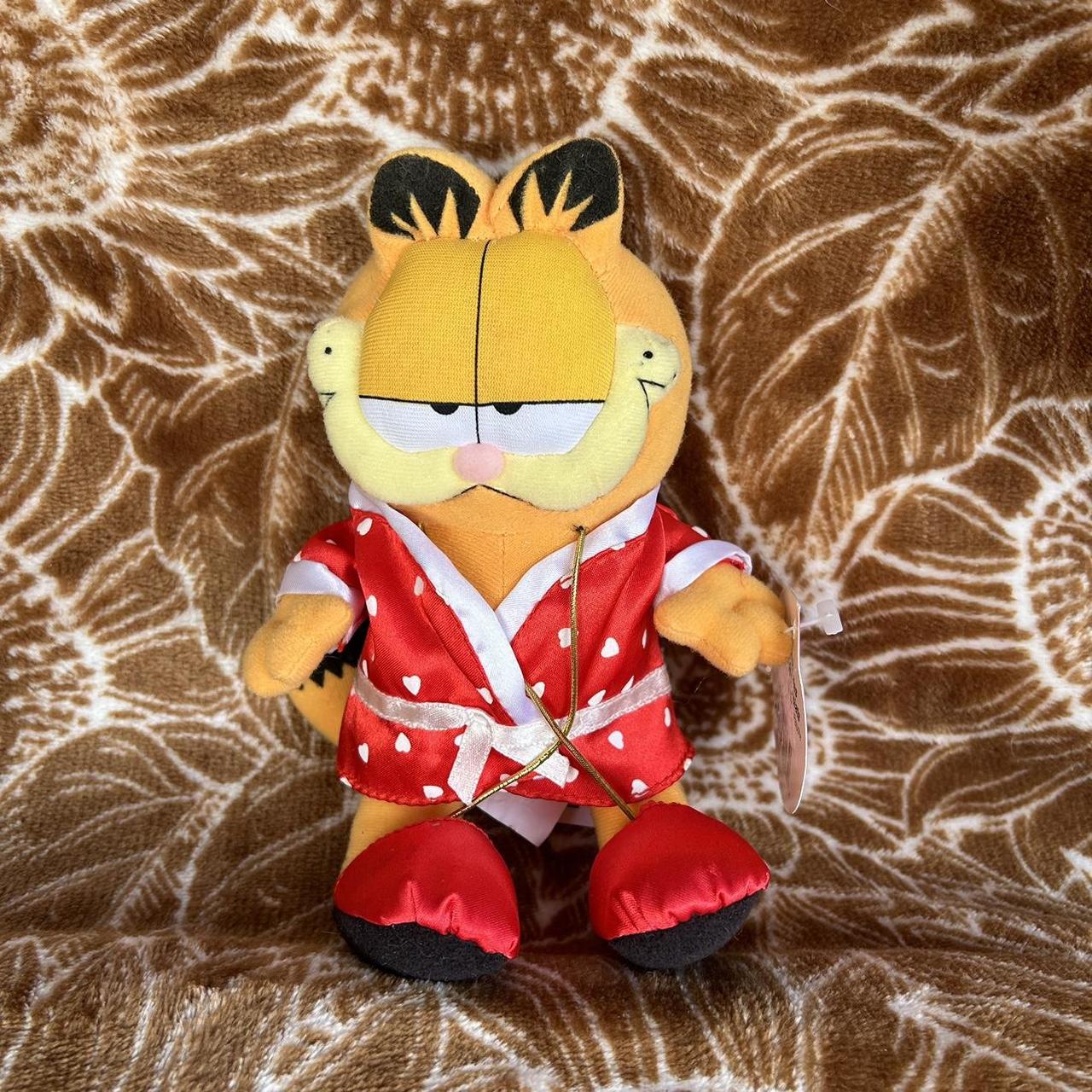 Valentine’s Day Garfield with gold stretchy rubber... - Depop