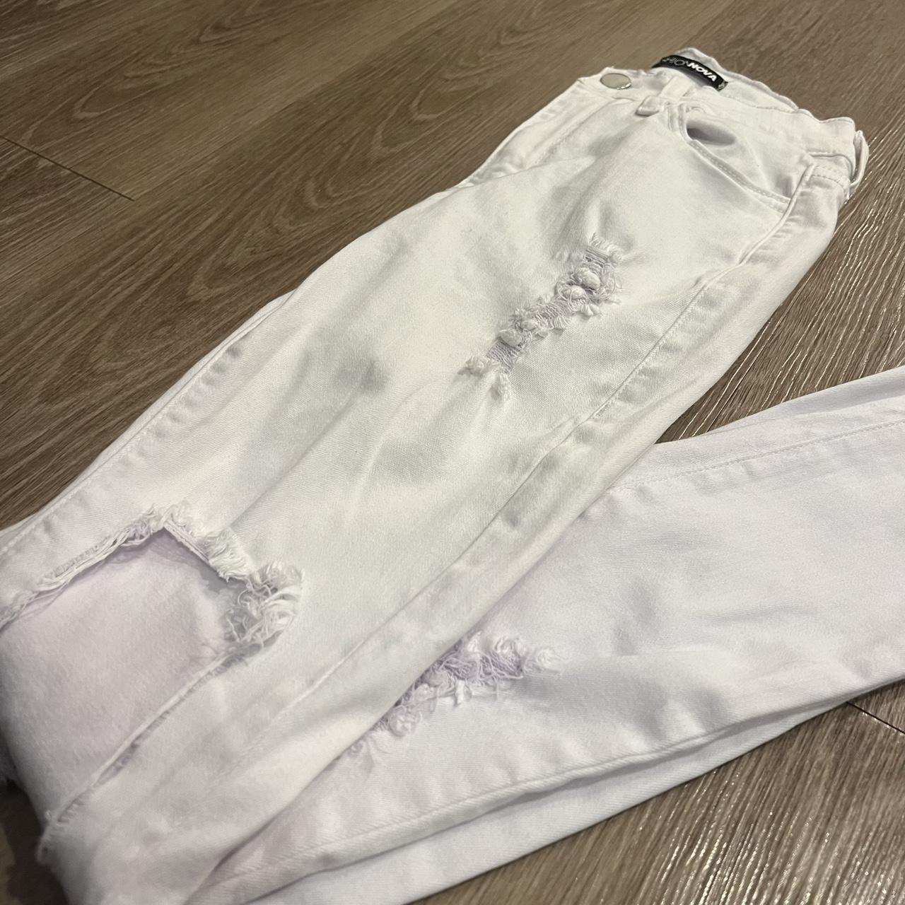 White distressed / ripped skinny jeans with good... - Depop