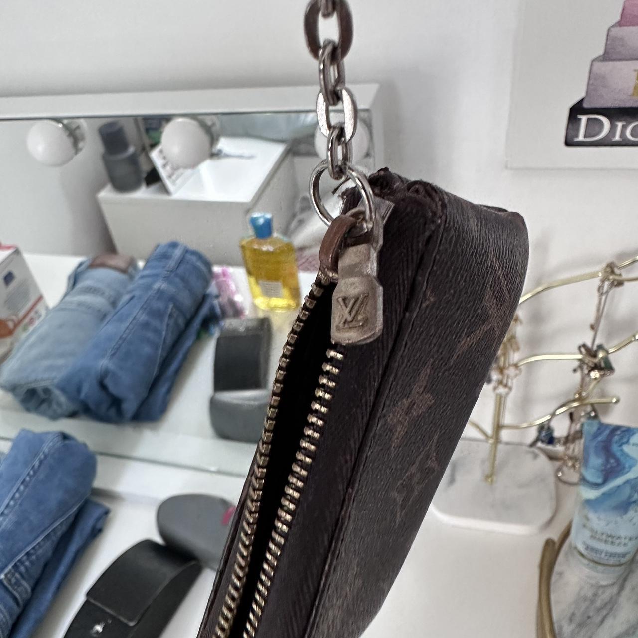 louis vuitton key pouch chain is attached to zipper... - Depop