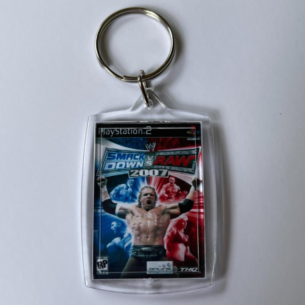 WWE Smackdown VS Raw 2007 PlayStation 2 Keychain... - Depop