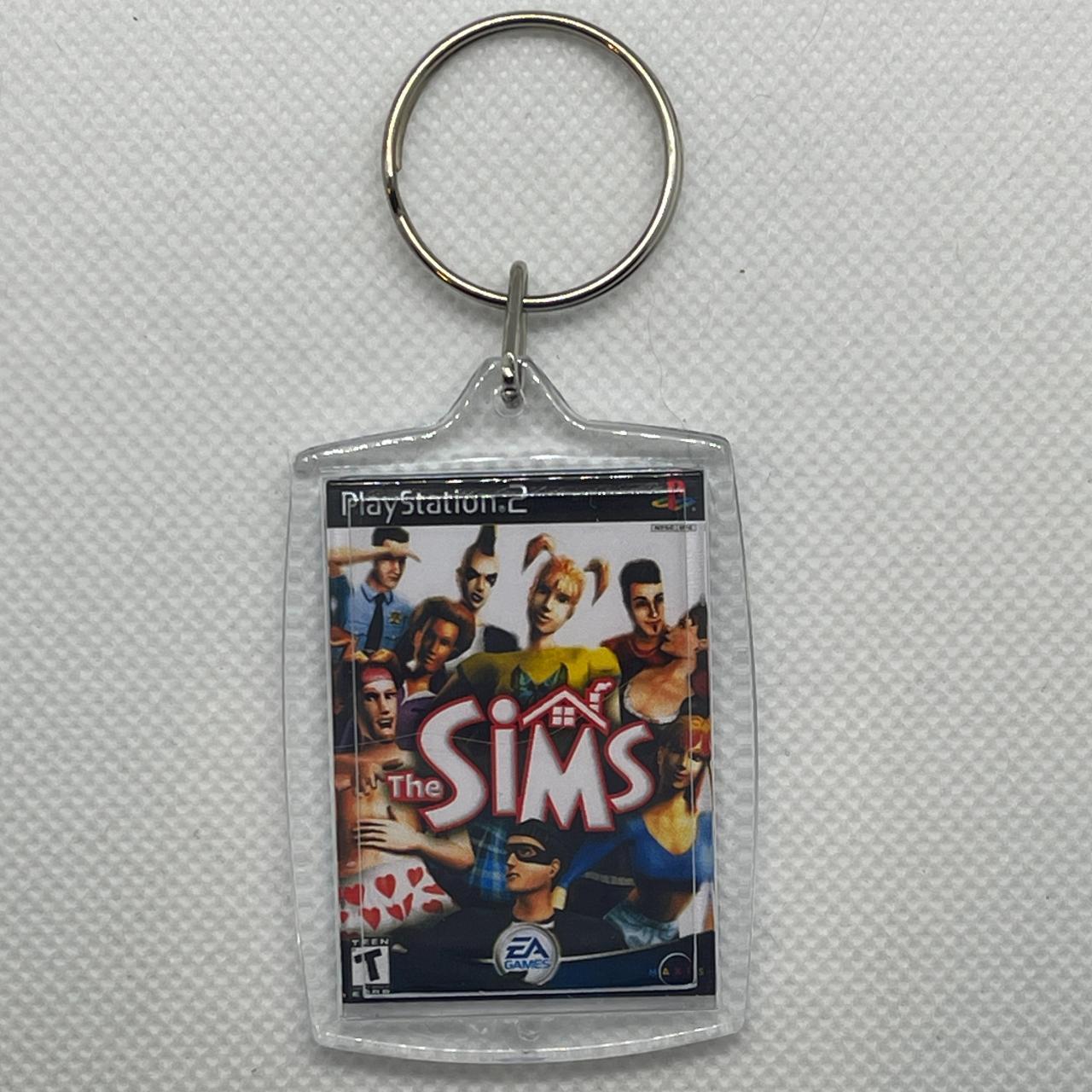 The Sims PlayStation 2 Keychain (PLEASE READ... - Depop