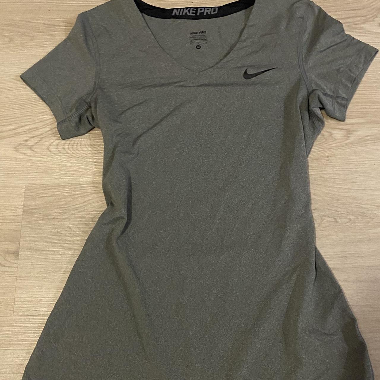 grey nike dri-fit v neck workout/exercise shirt size... - Depop