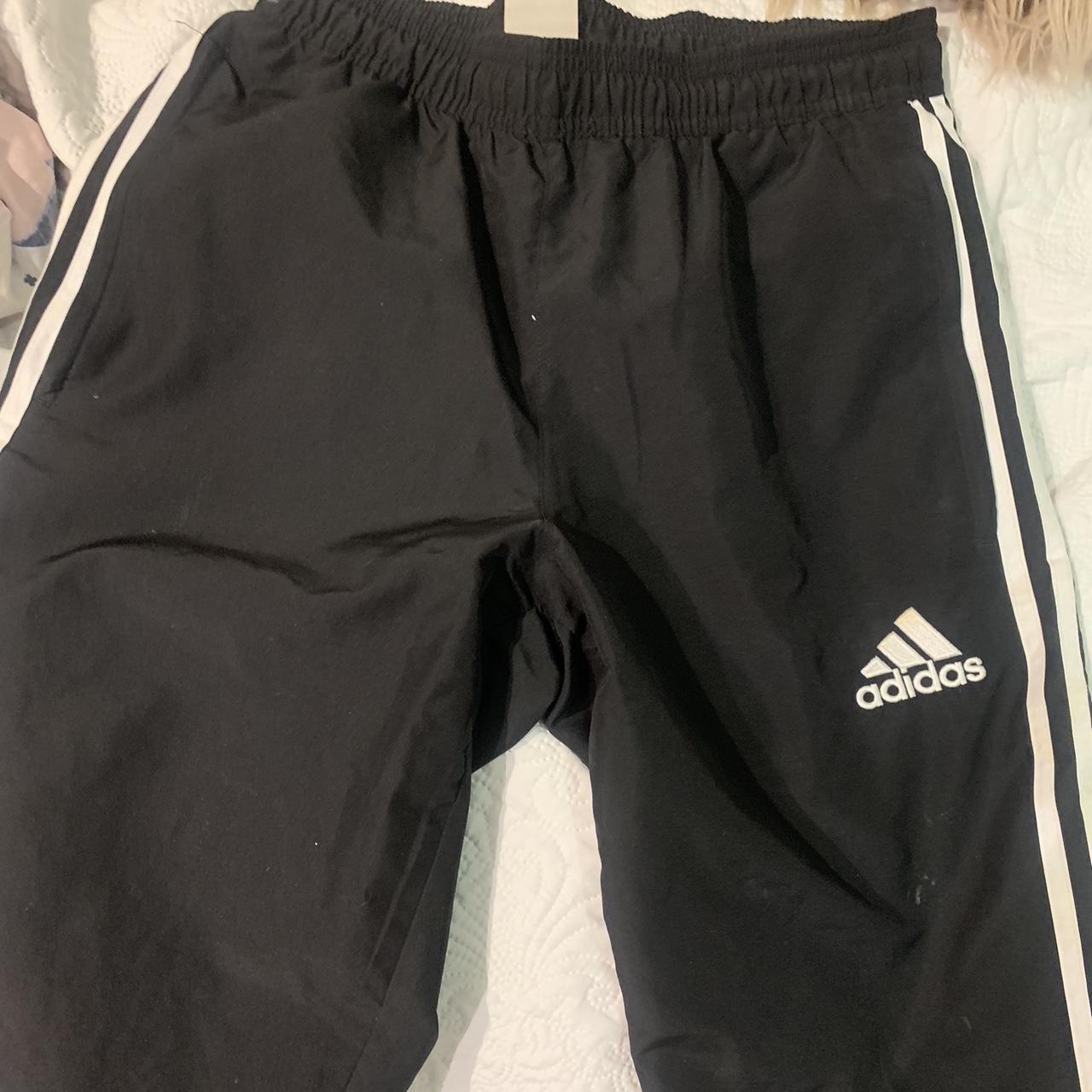 selling these adidas low rise baggy track... - Depop