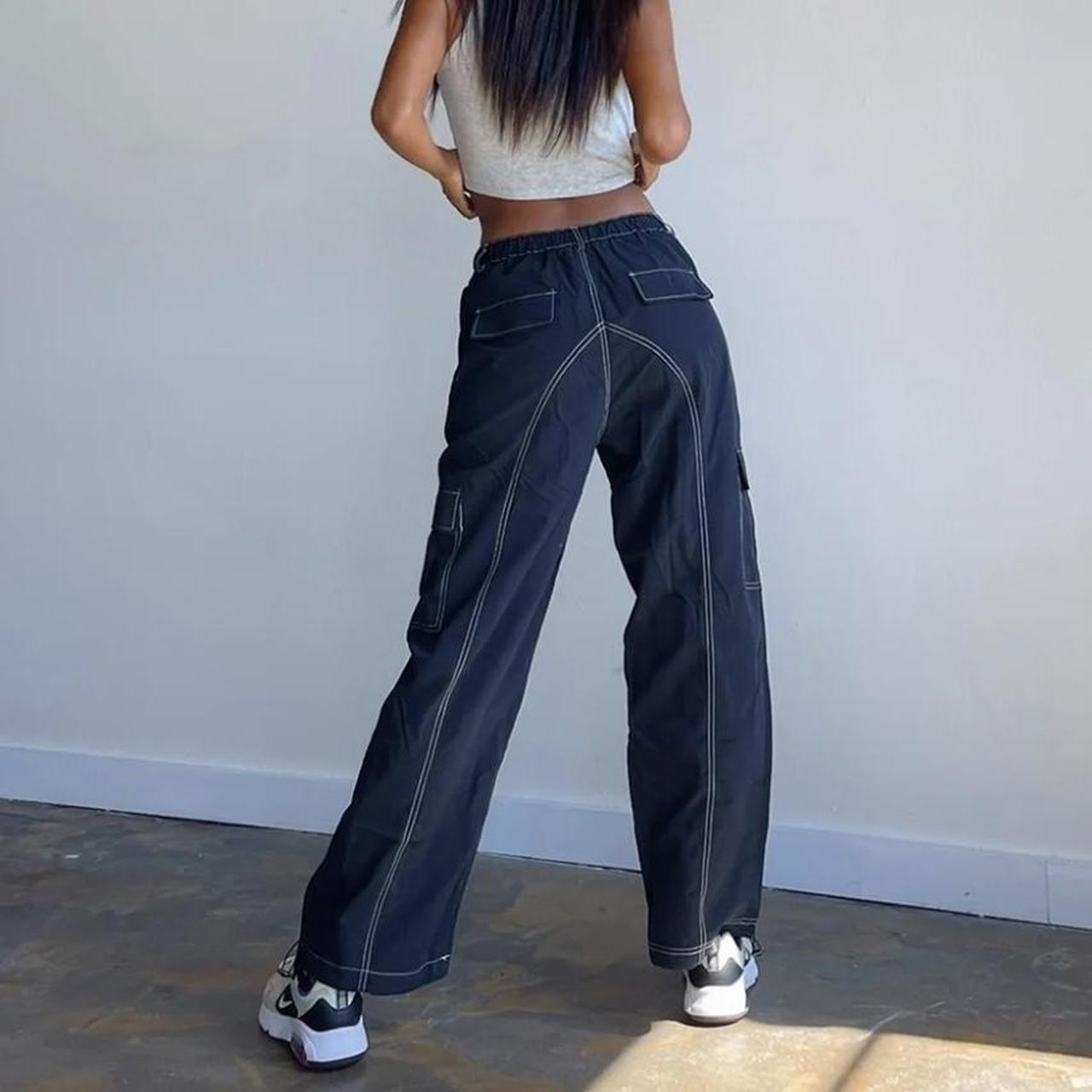 Black parachute pants with white stitching Great... - Depop