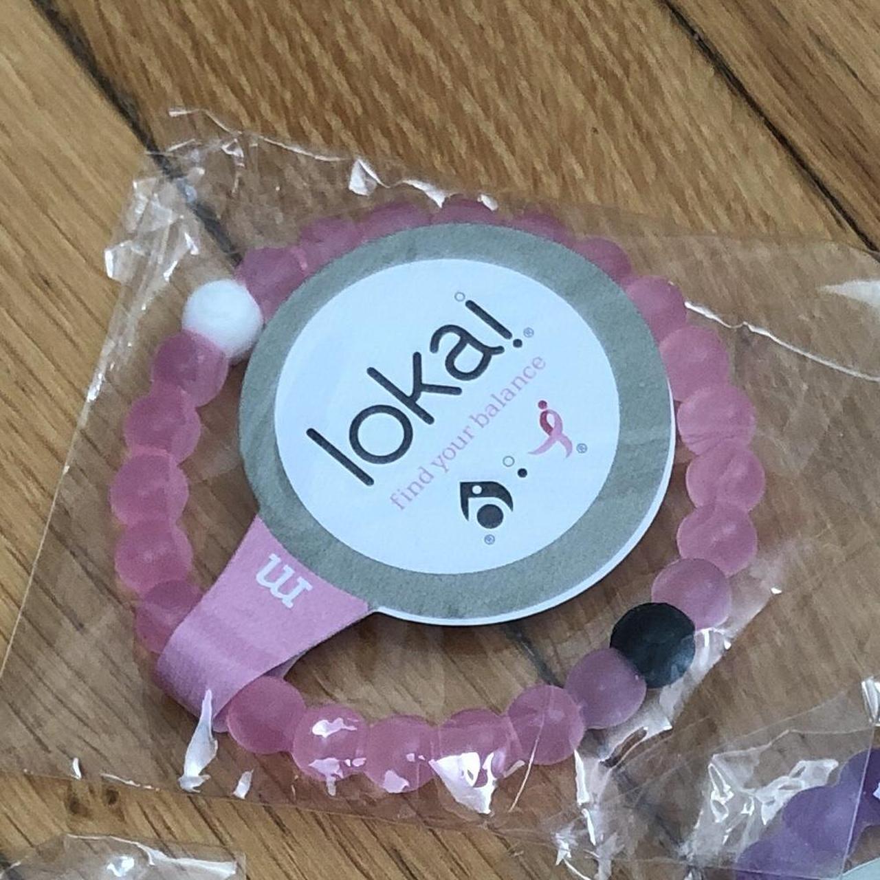Lokai pink bracelet, water from the Dead Sea and... - Depop