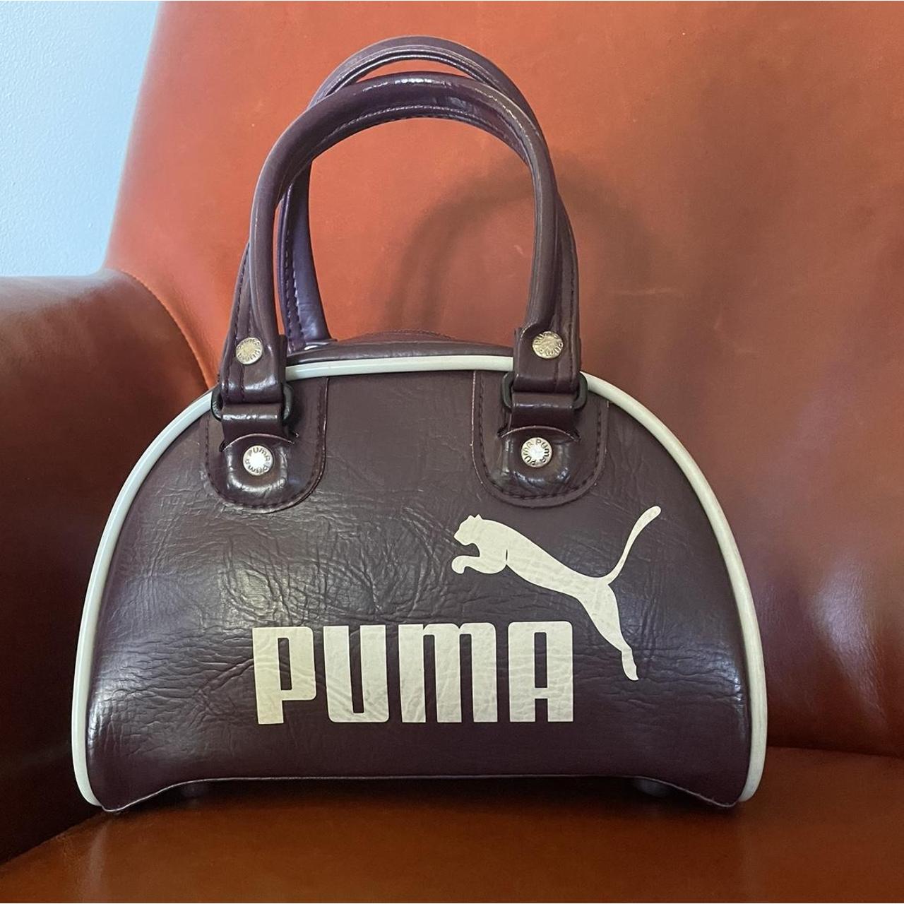 Purple Puma bowler handbag Design reminiscent of... - Depop