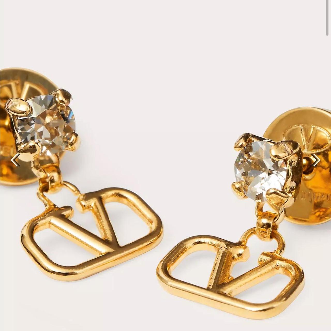 VLOGO SIGNATURE EARRINGS IN METAL AND SWAROVSKI®... | Depop