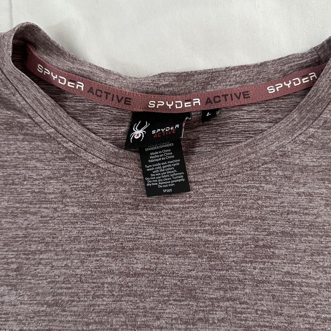 Spyder athletic fit T-Shirt. Size L but can fit a... - Depop