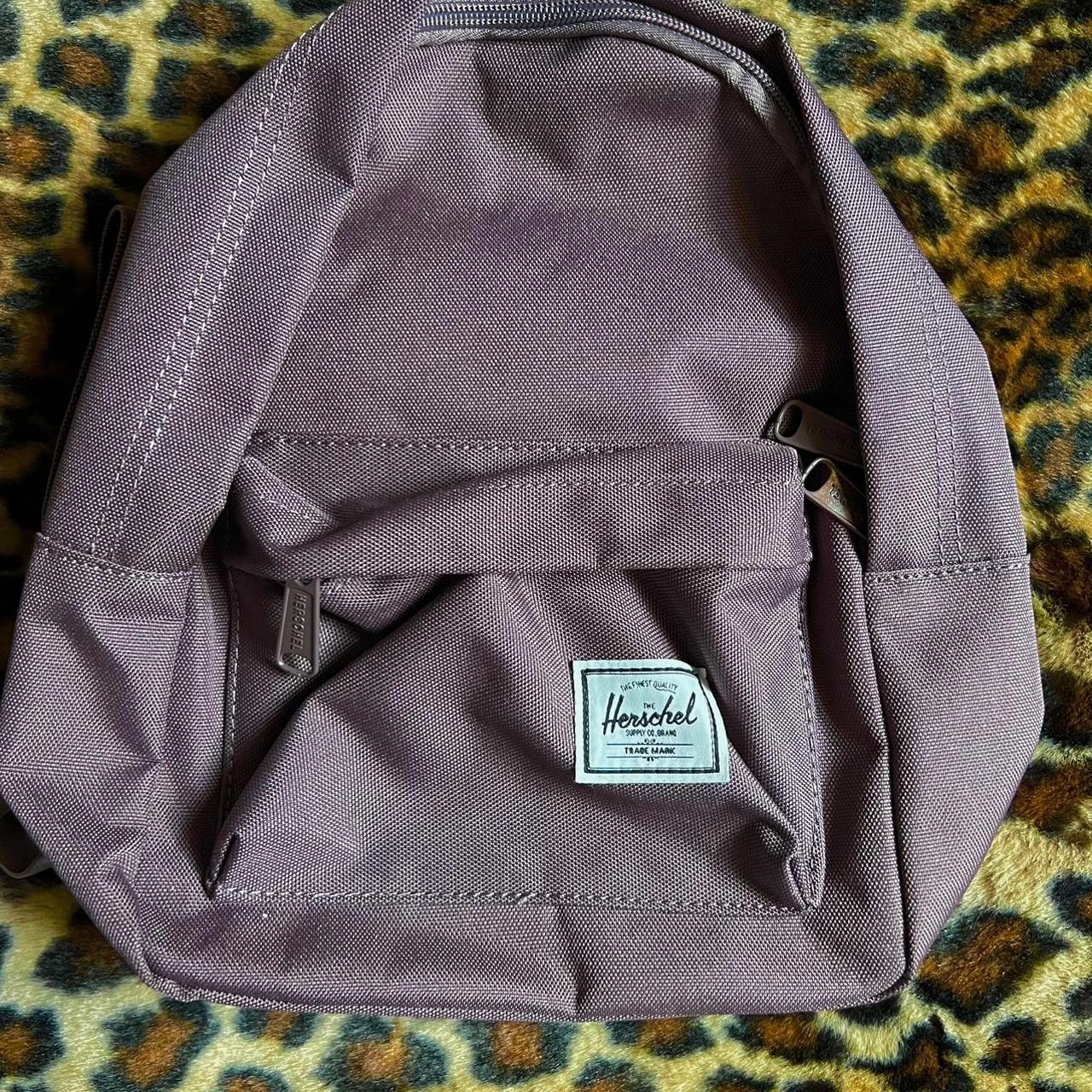 Herschel purple mini backpack! this backpack is in... - Depop