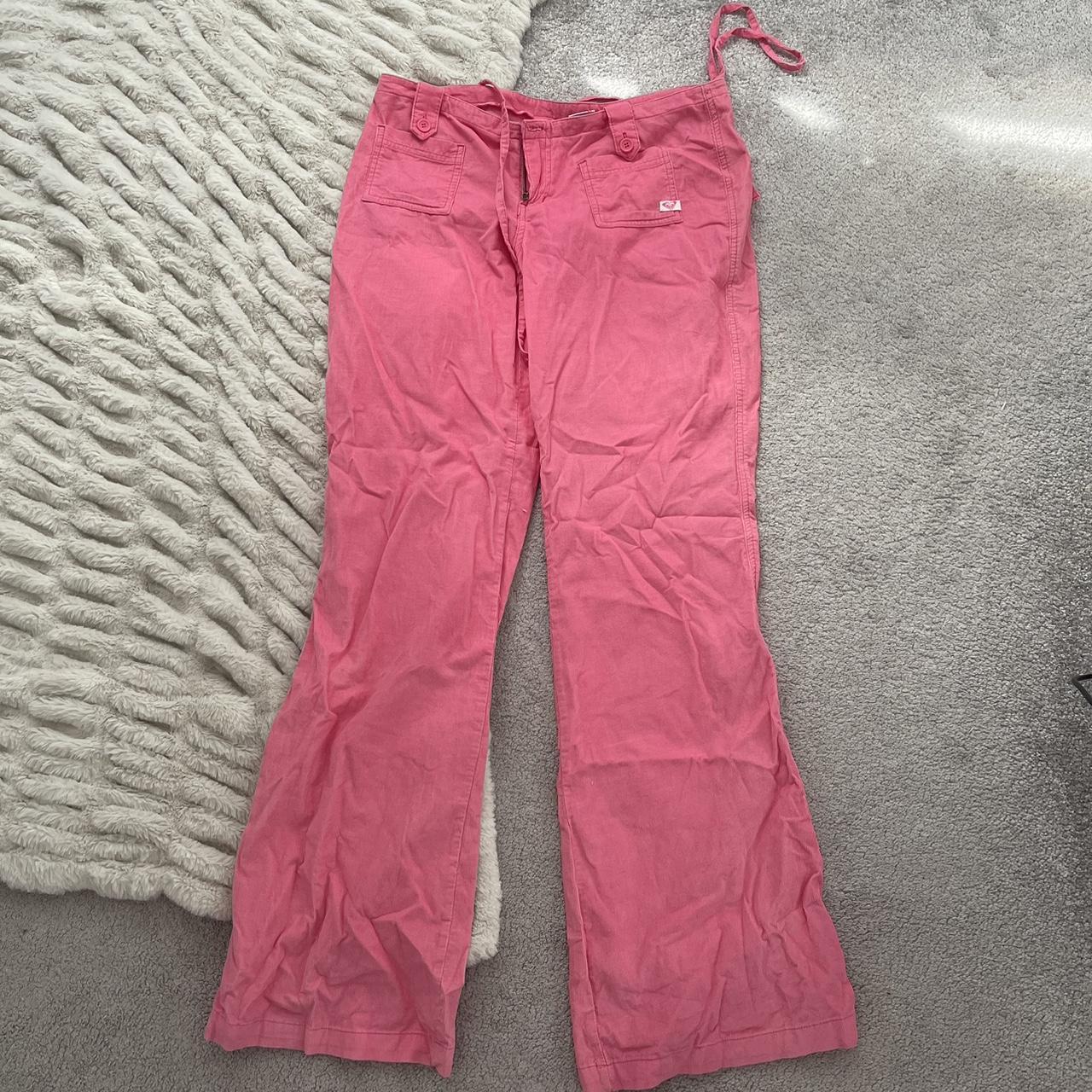 The cutest pink y2k Roxy flared trousers. These are... - Depop