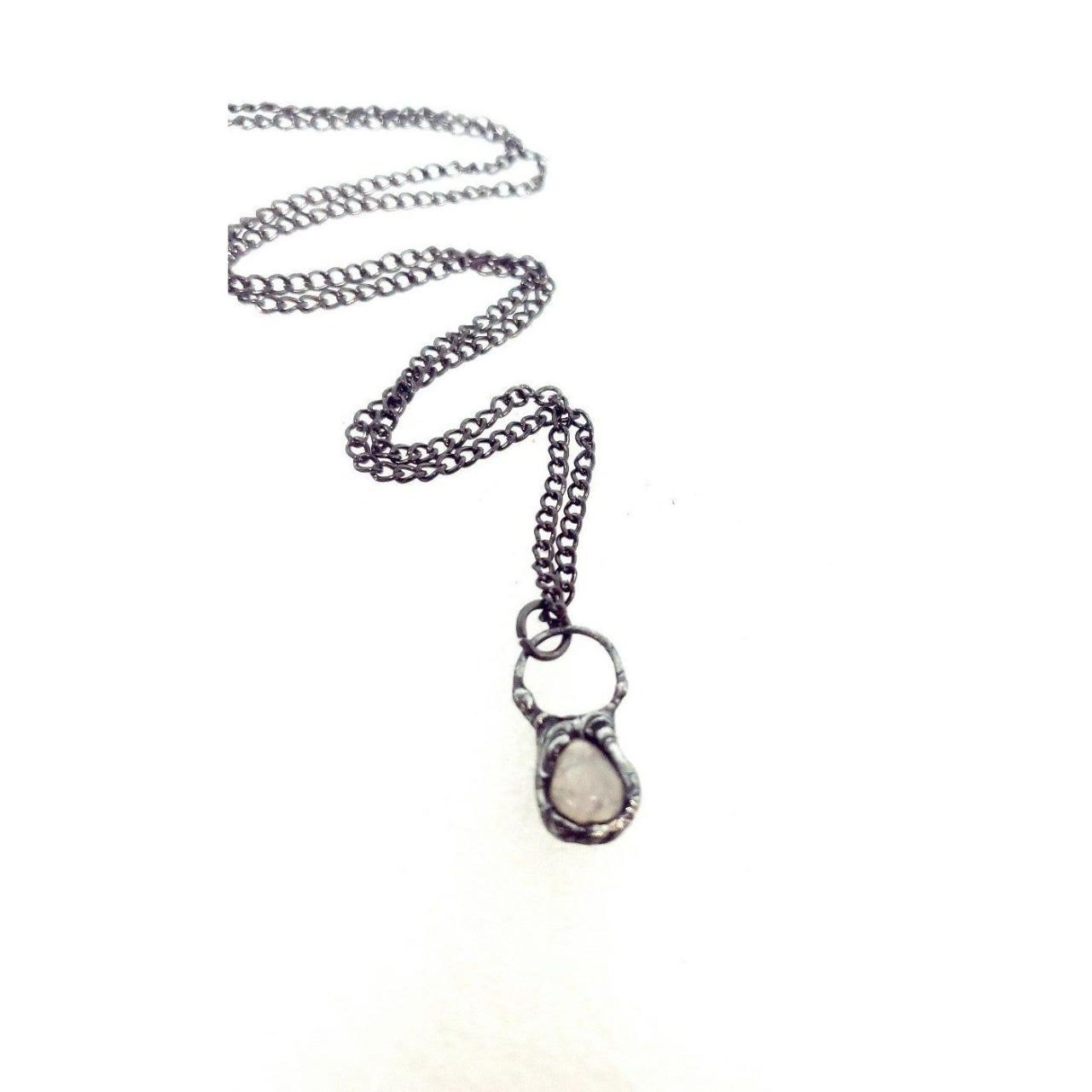 An amazingly unique tiny moonstone cystal tear drop... - Depop