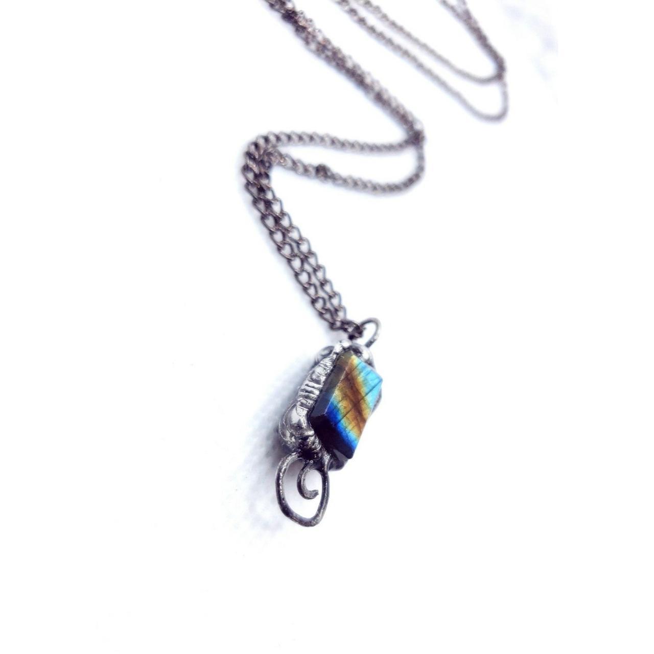 A brillant small rectangular shaped faceted... - Depop