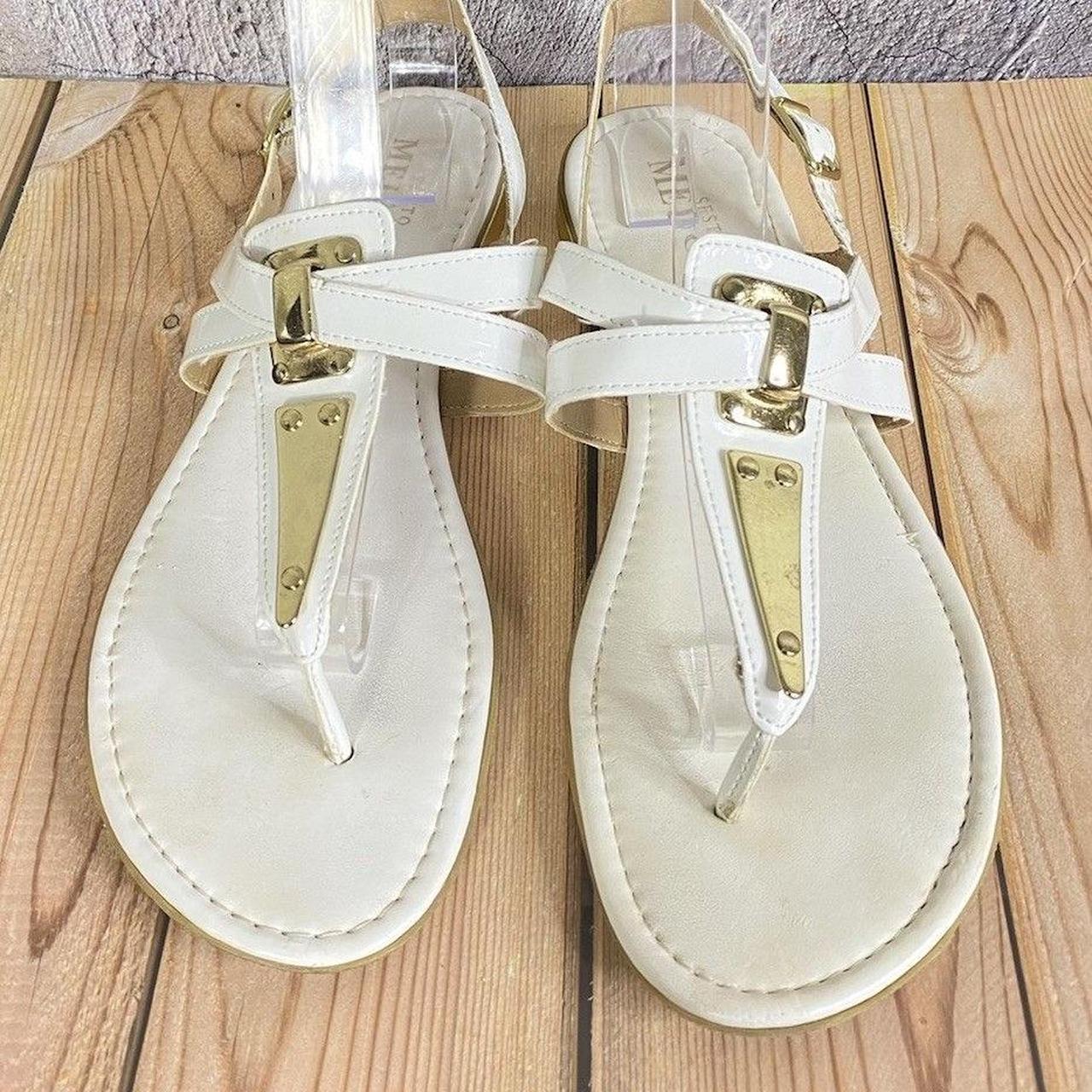 These Sesto Meucci sandals feature a striking gold... | Depop