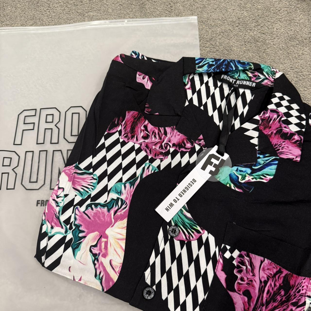 Front Runner black and pink shirt, size XXS but is a... - Depop