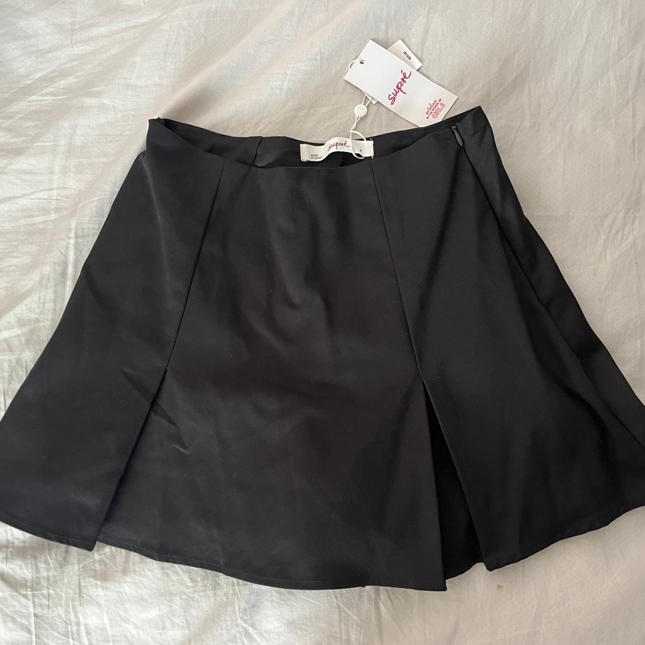 Black Supré pleated mini skirt with shorts... | Depop