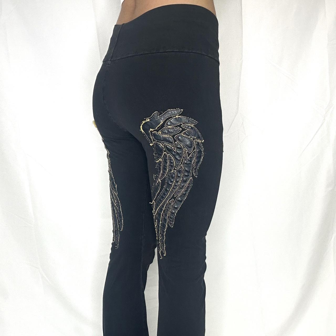 Y2K ANGEL WINGS FLARED PANTS black angel wing fold... - Depop