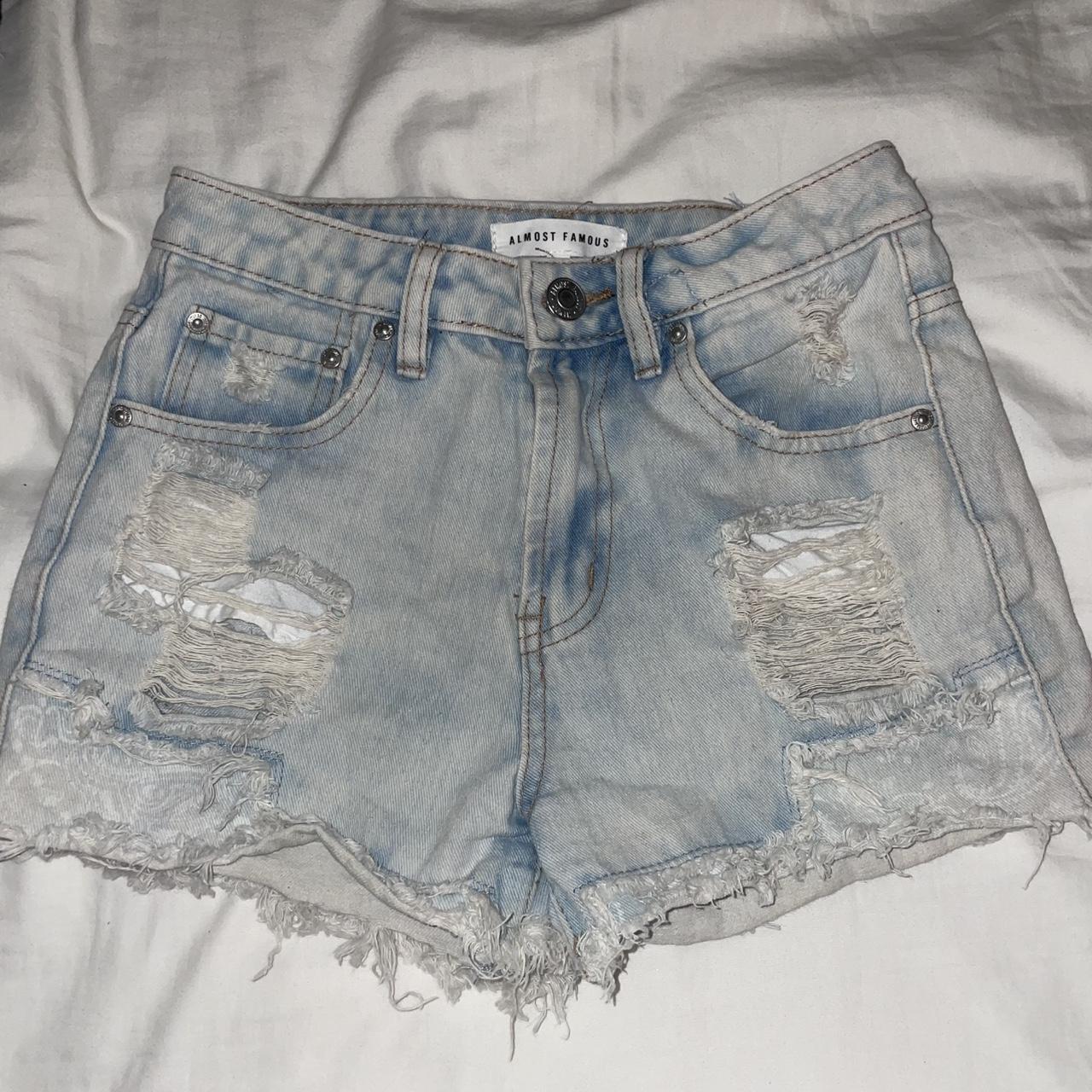 light washed blue denim jean ripped shorts, never... - Depop