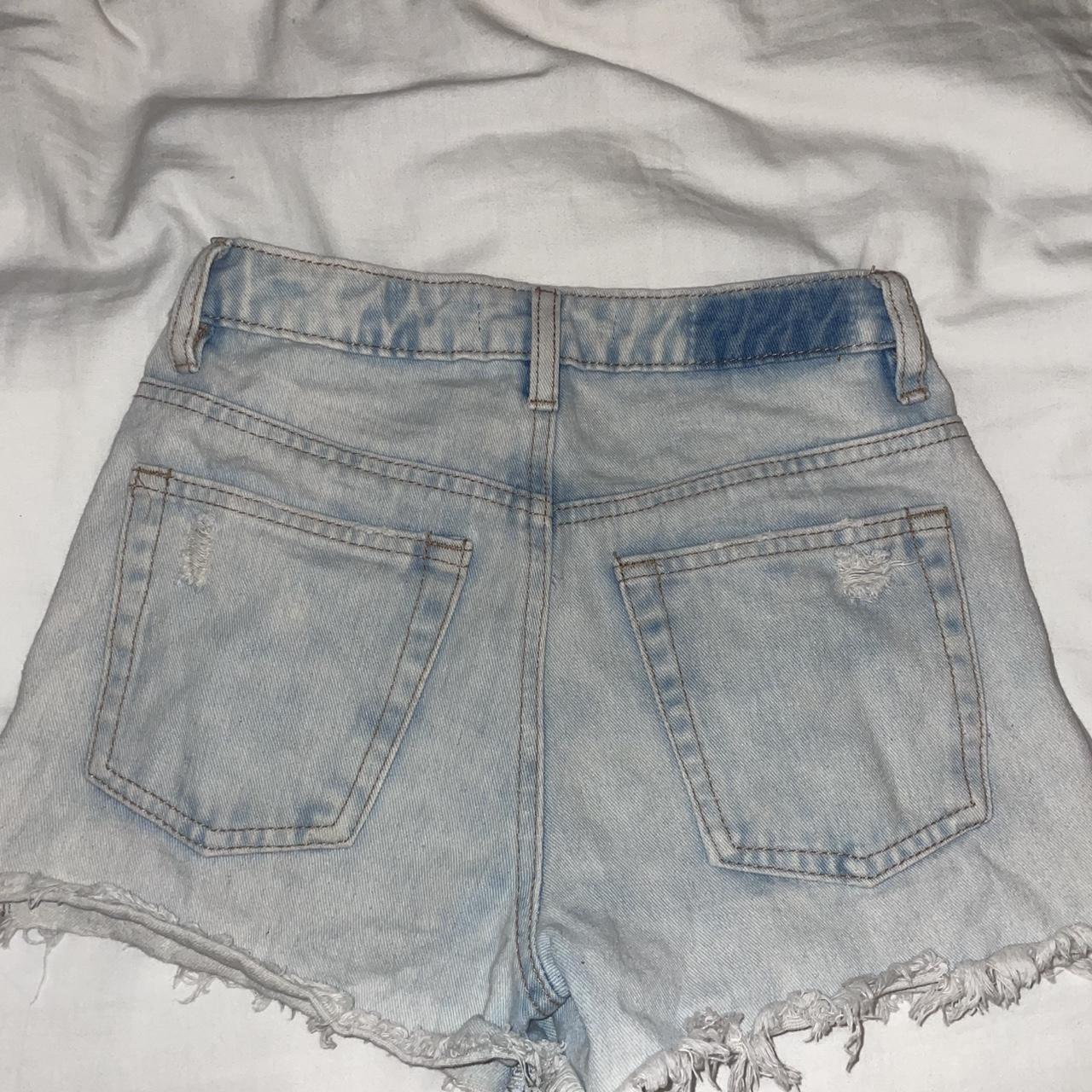 light washed blue denim jean ripped shorts, never... - Depop