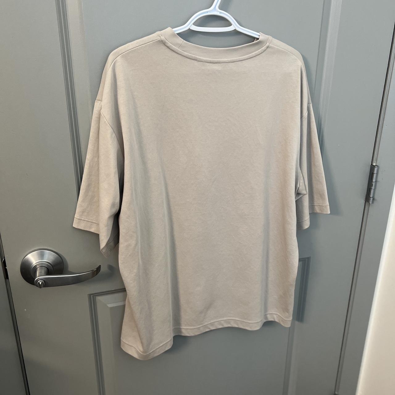 Uniqlo airISM Tee in light grey, size large - No... - Depop