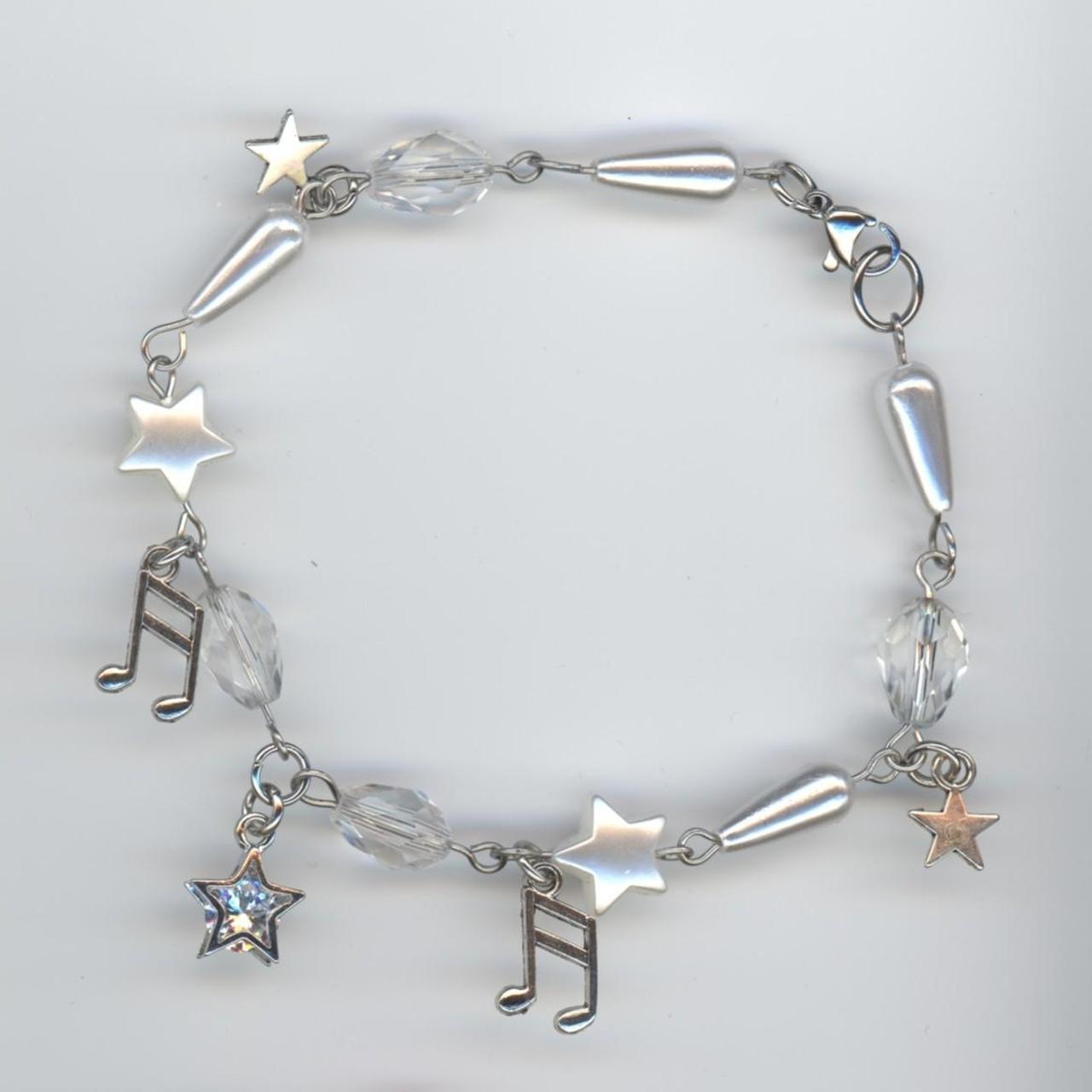 cute Y2K Acubi bracelet with star charms #y2k... - Depop