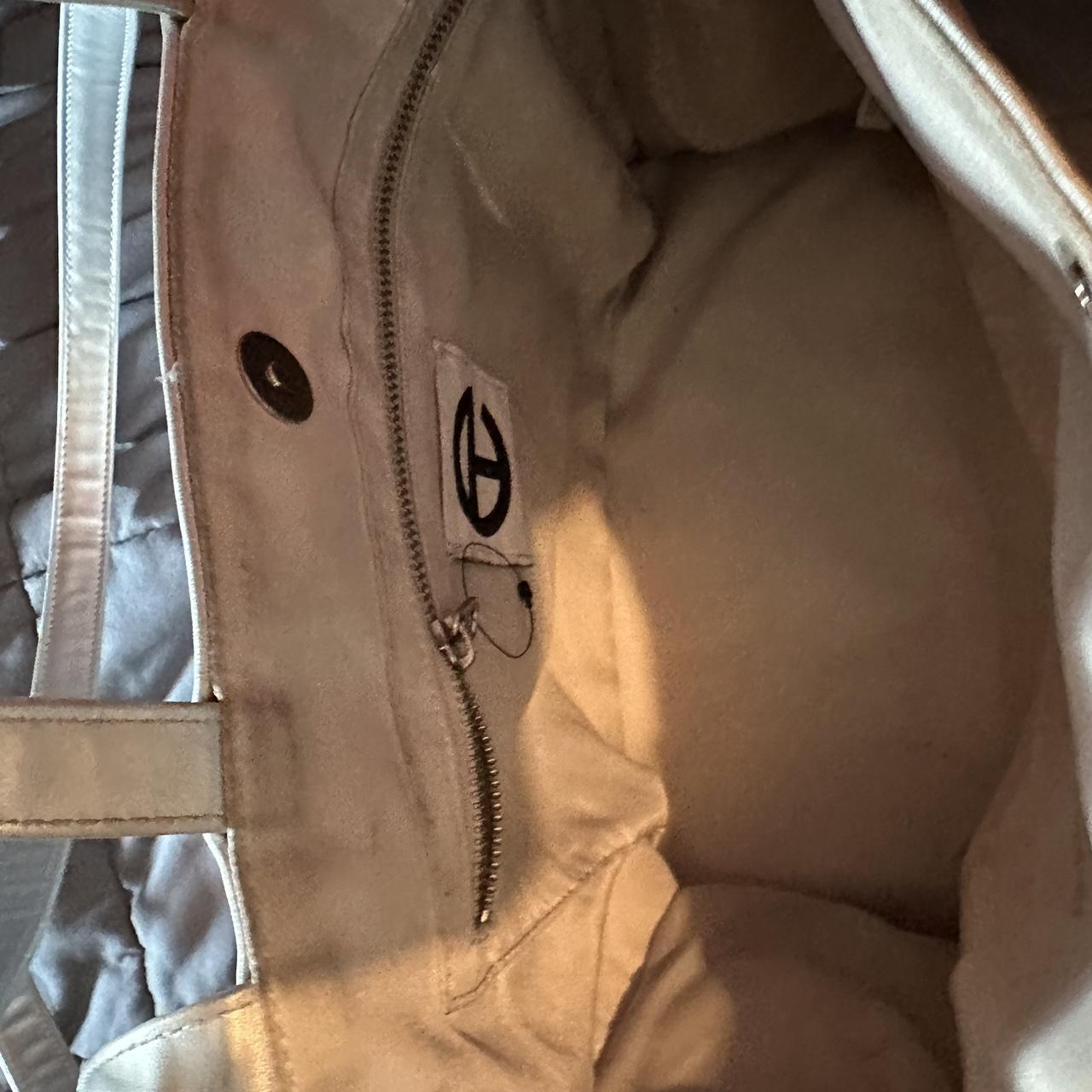 Silver Telfar. A large. Price negotiable. Few... - Depop