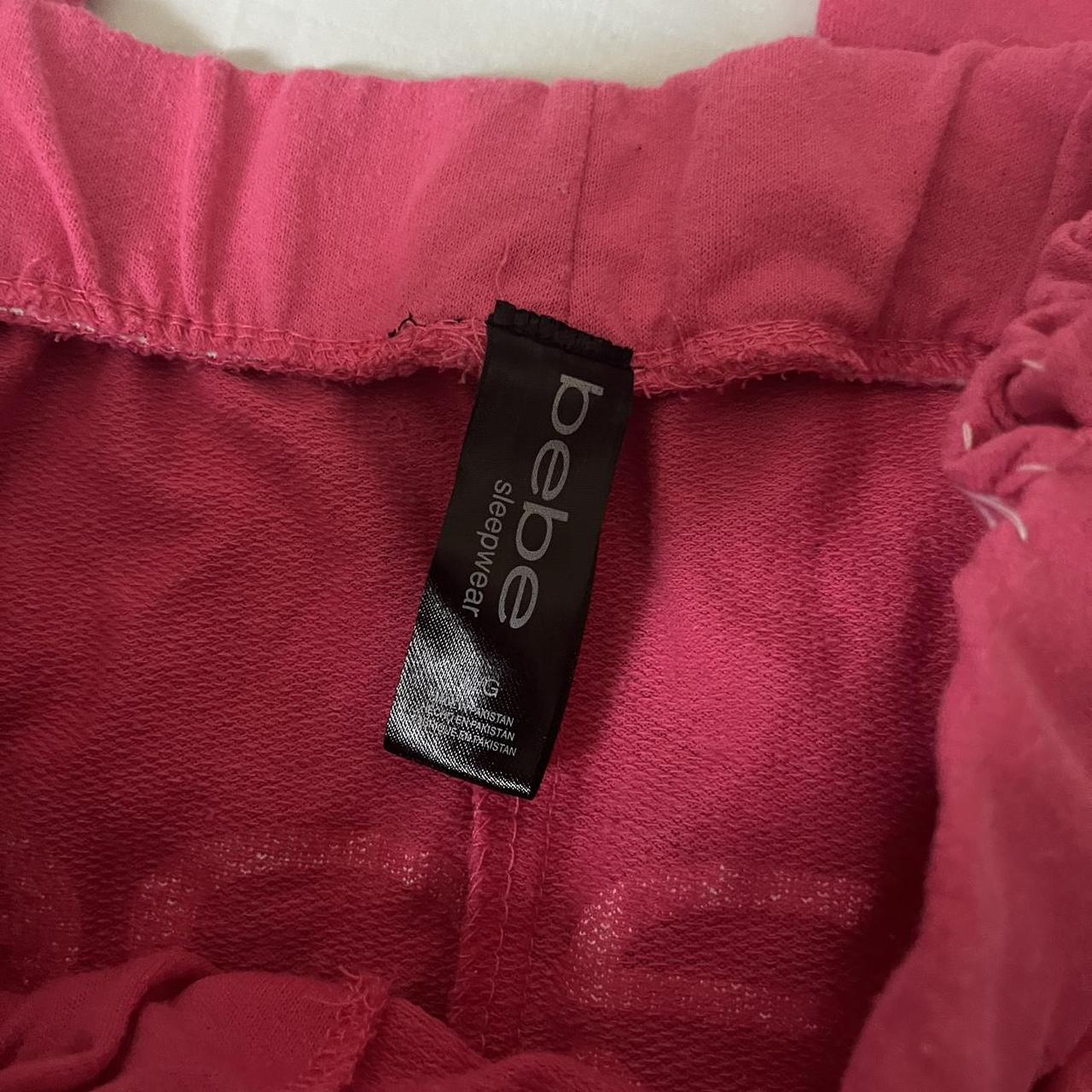 Pink Bebe sweatpants with white lettering #y2k... | Depop