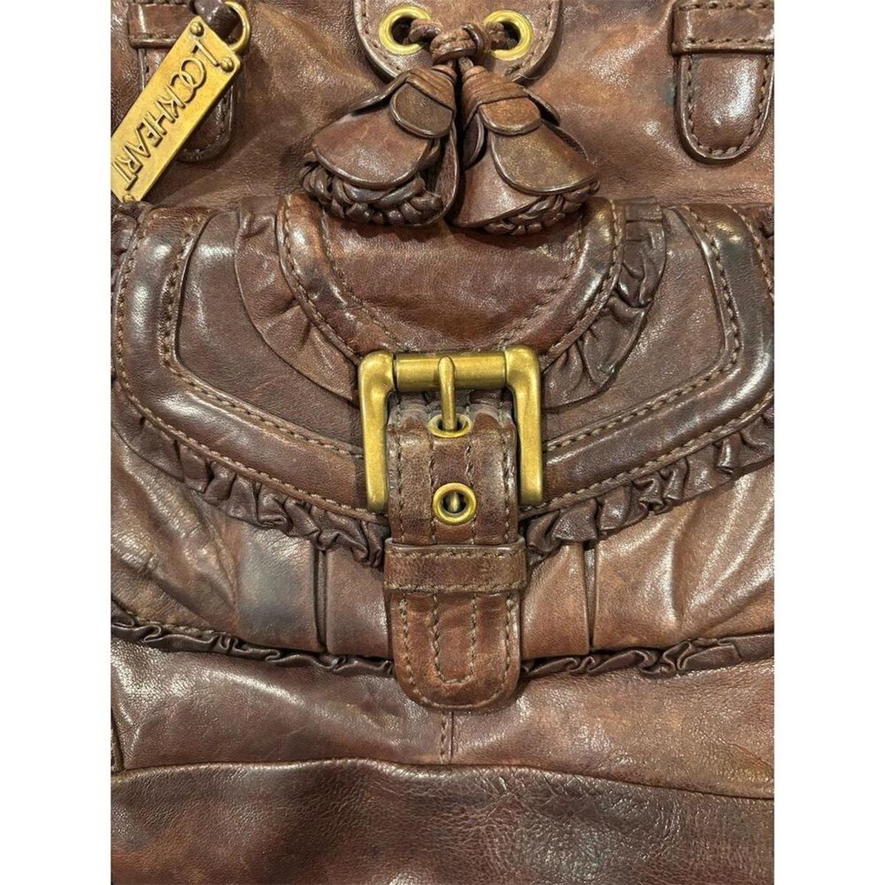 The Lockhart satchel/top handle bag is crafted from... | Depop