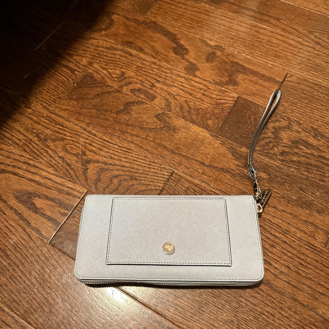 Light blue Michael Kors wristlet/wallet. Tried to... - Depop